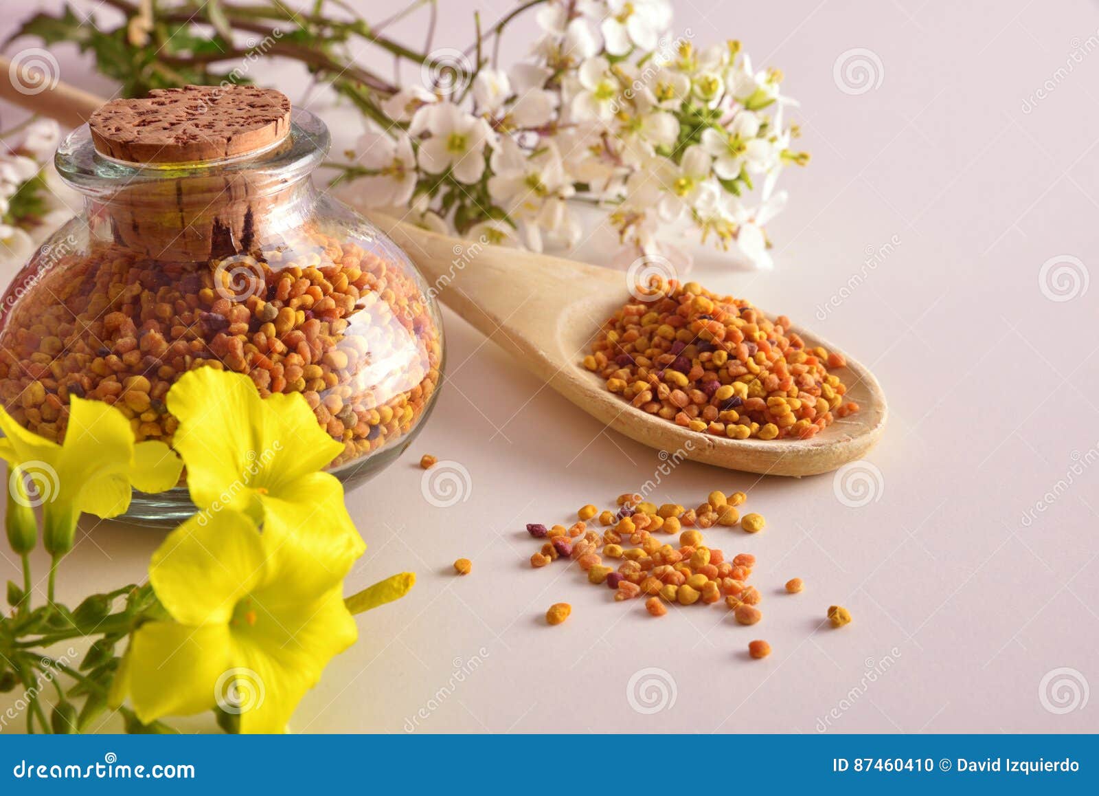 Grains of Bee Pollen in Jar and Wooden Spoon Elevated Stock Photo ...