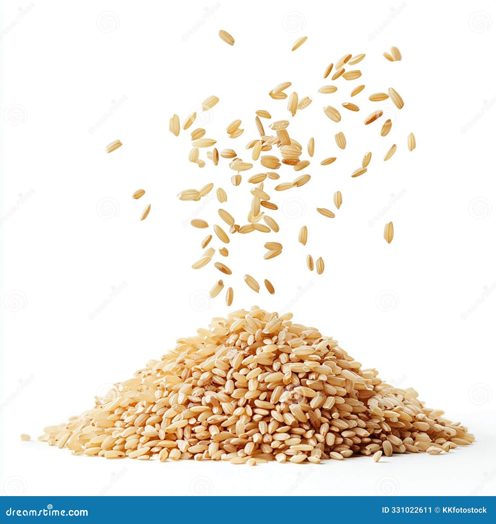 Grains of Brown Rice Falling into a Pile on White Background Stock ...