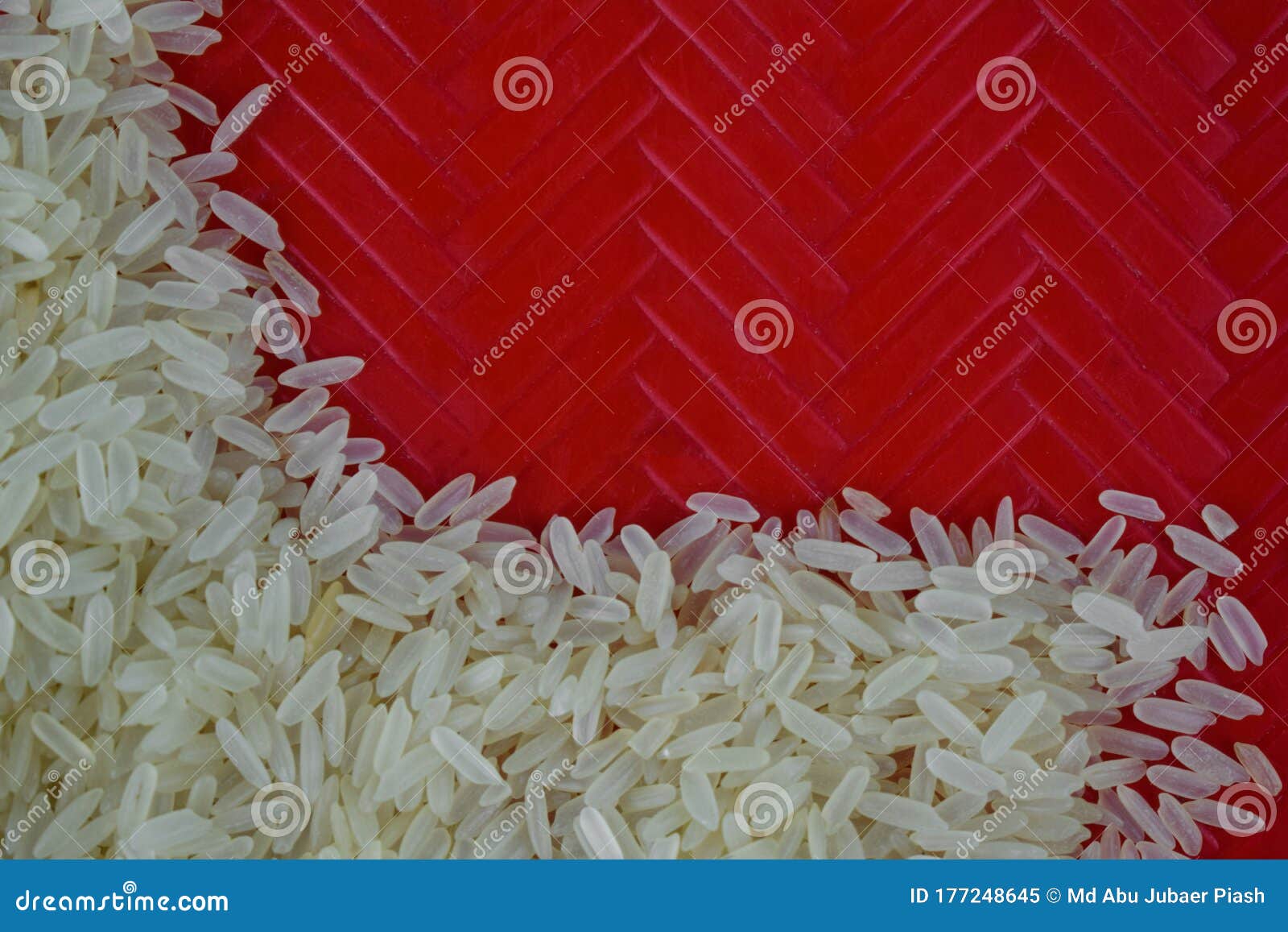 Grains of Rice Held in a Designed Red Carpet Where the Rice Grains are ...