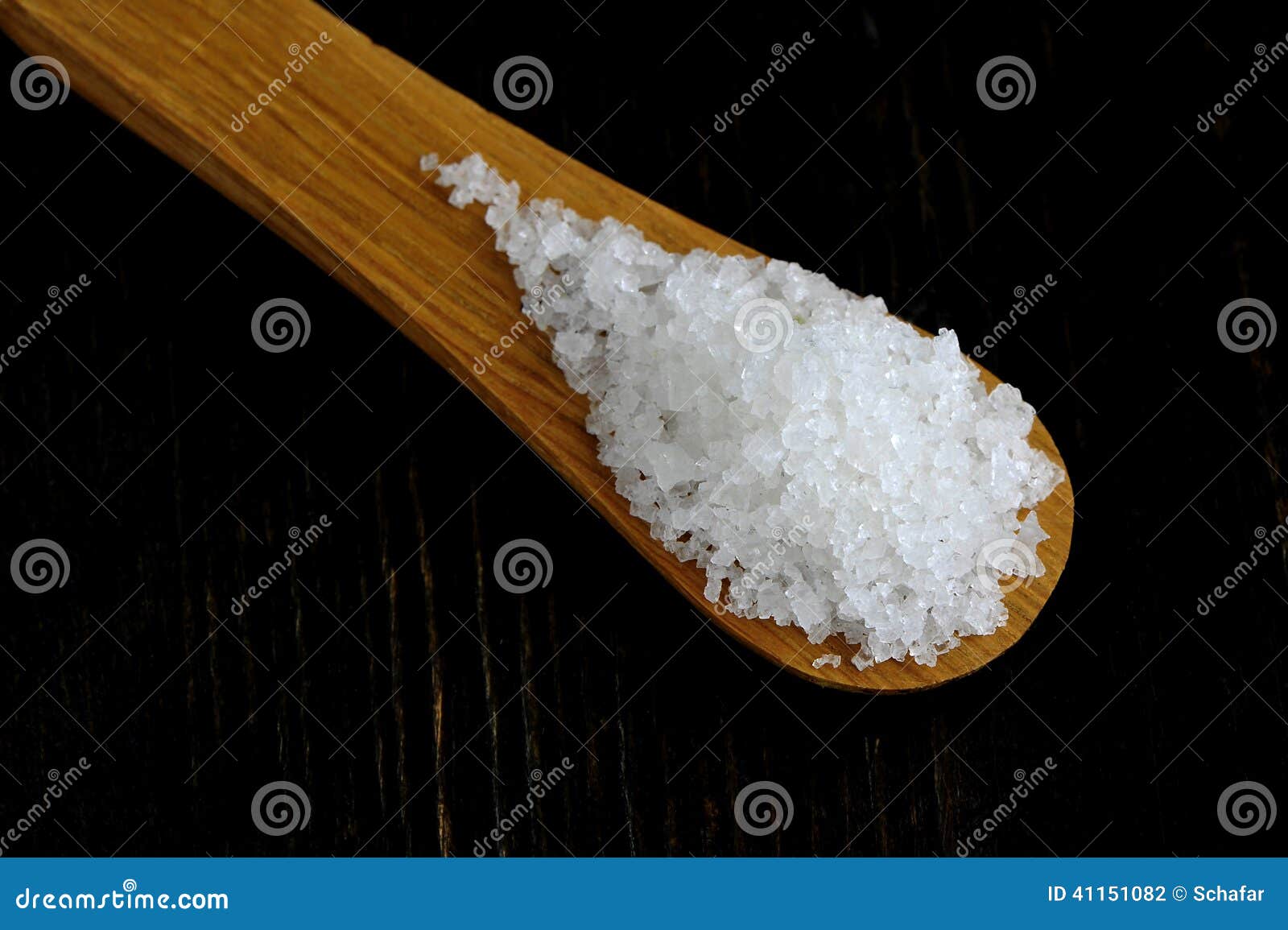 Grains of Salt on a Wooden Spoon Stock Photo - Image of salt, isolated ...