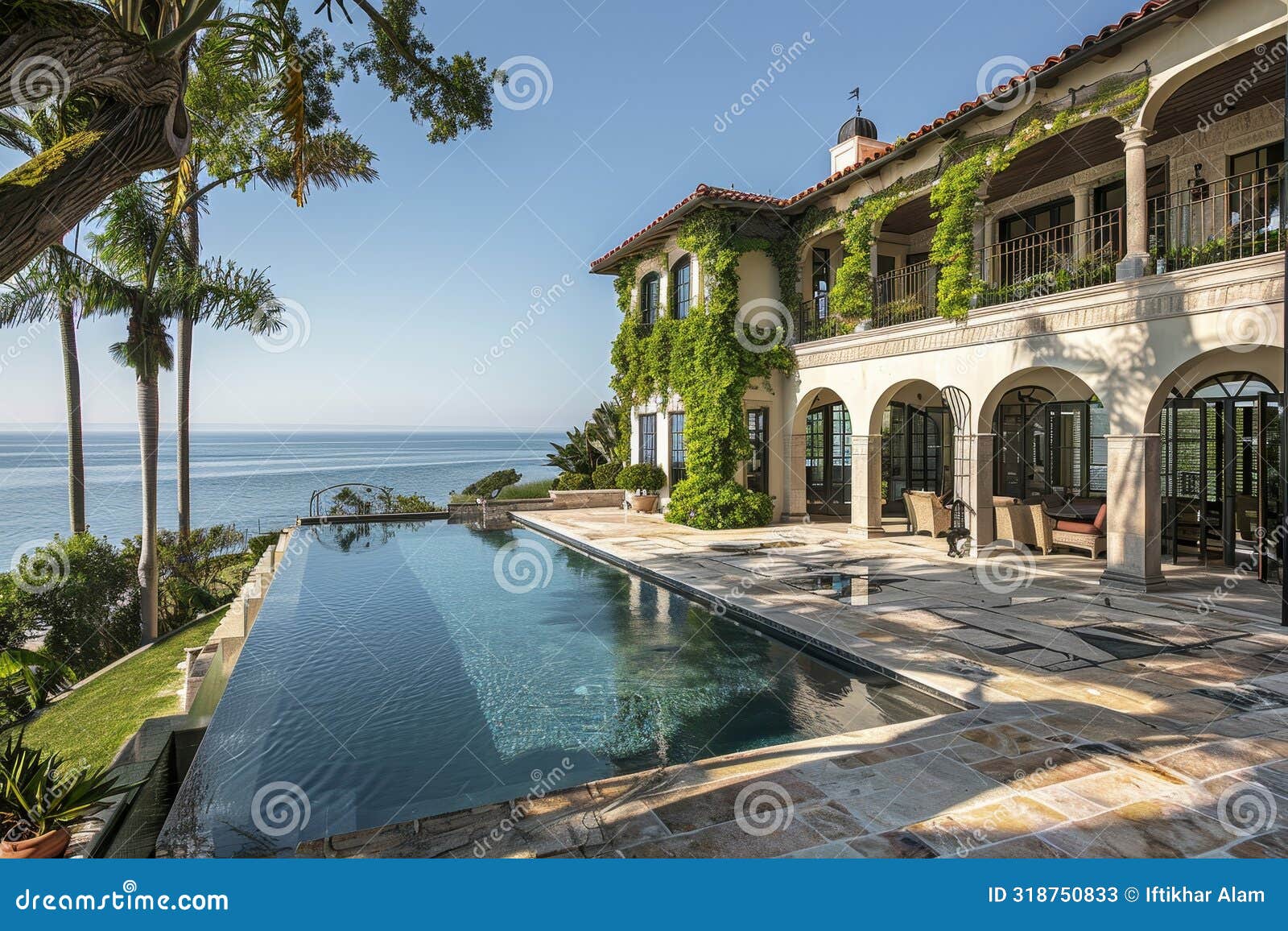 A Grand House with a Pool in Front, Overlooking the Ocean, a Waterfront ...