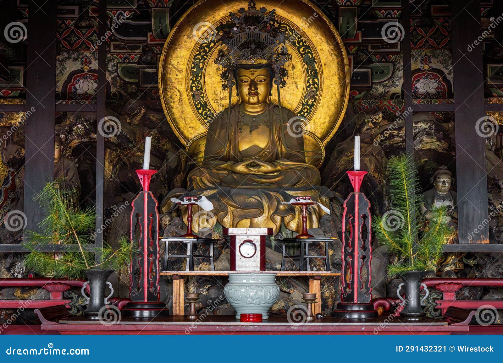 Grand, Ornate Buddha Statue Stands in a Spacious, Well-lit Interior ...