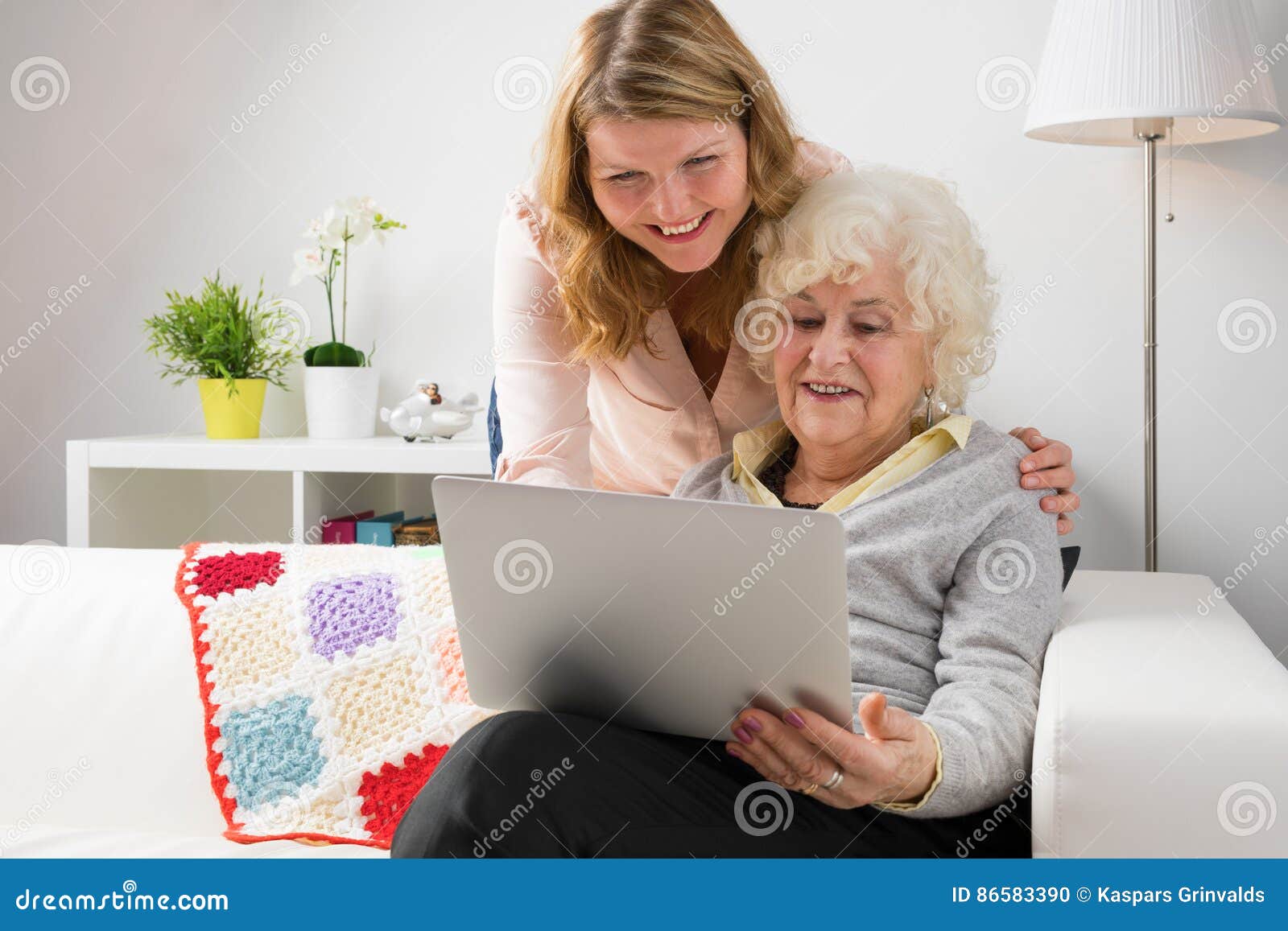 Grandaughter Teaching Grandma How To Use Modern Computer Stock Photo ...