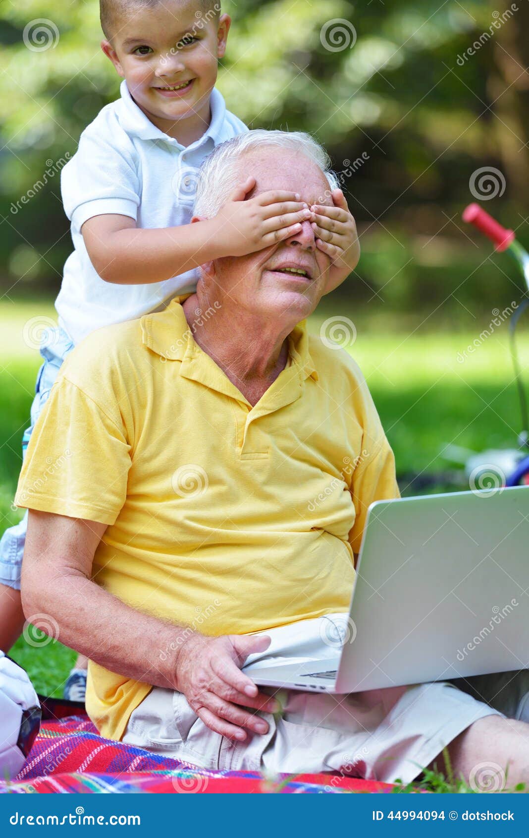 Grandfather and Child Using Laptop Stock Photo - Image of outdoor ...