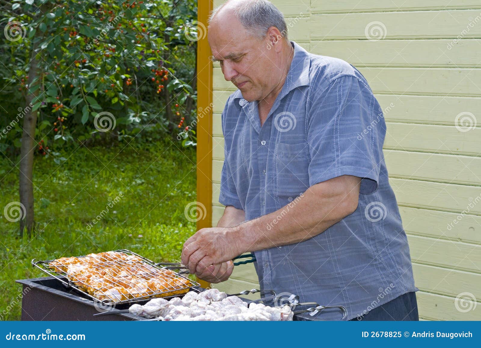 Grandfather does a kebab stock image. Image of grilled - 2678825
