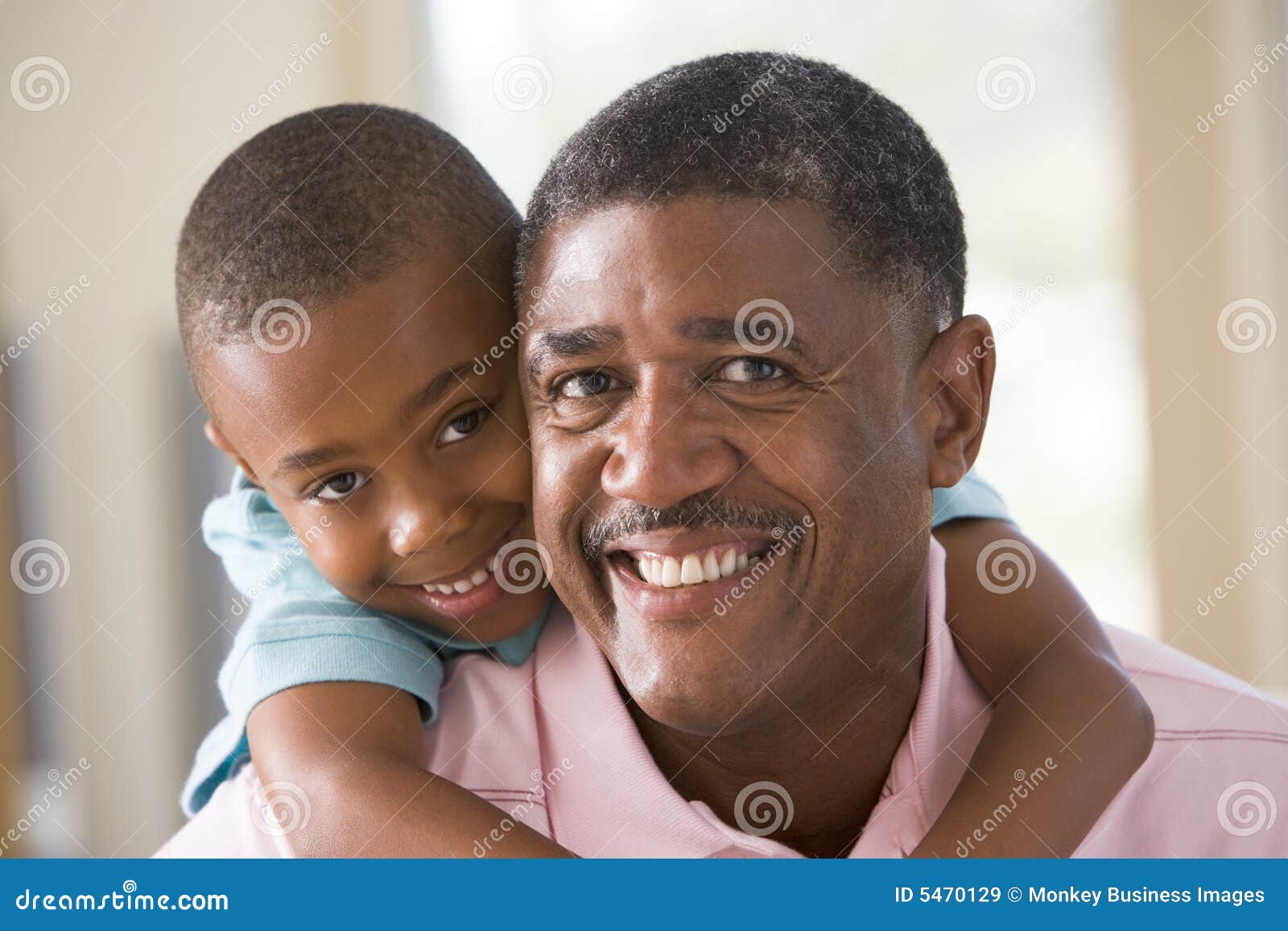 Grandfather and Grandson Smiling Stock Image - Image of head, mature ...