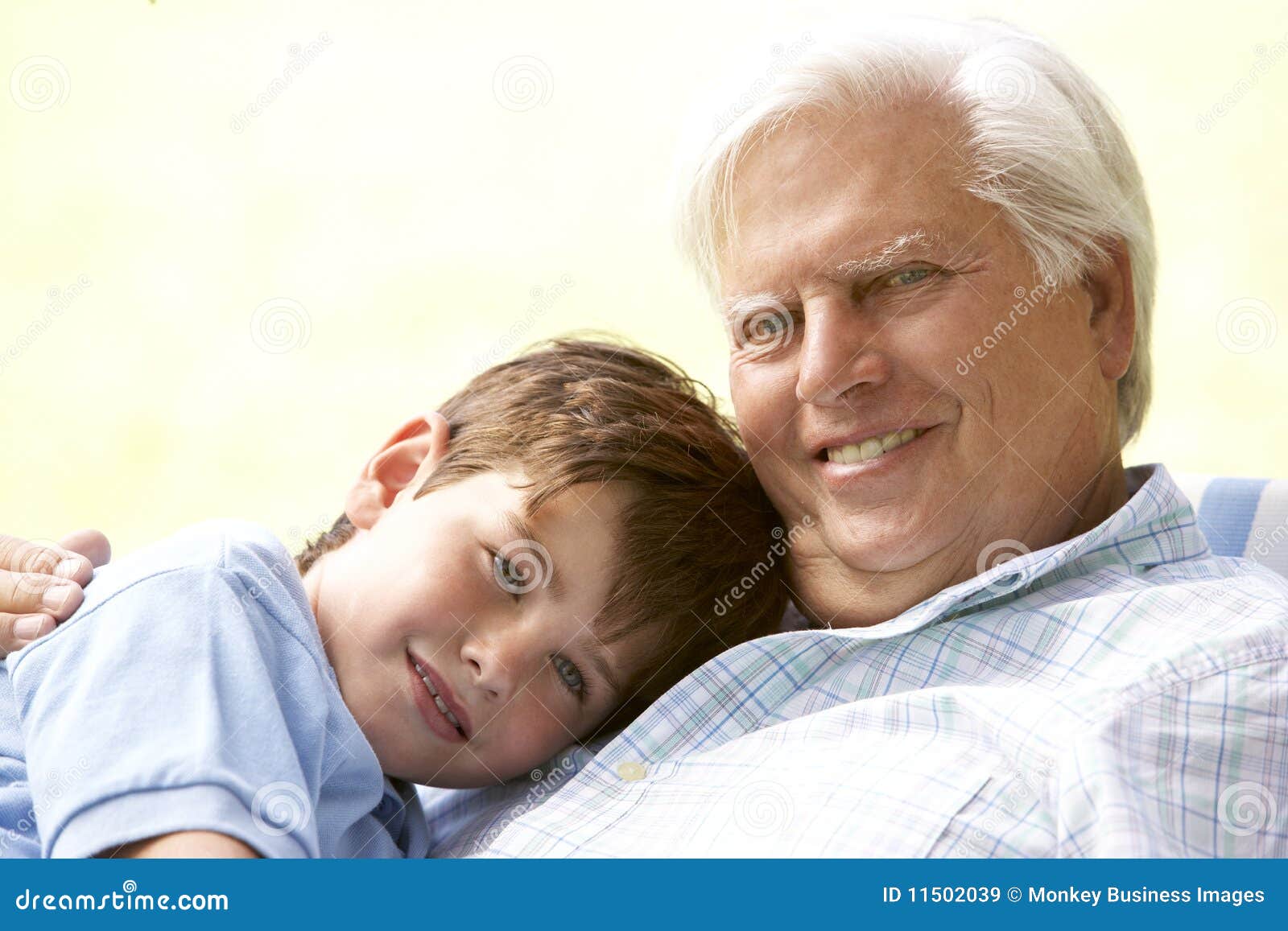 Grandfather Hugging Grandson in Park Stock Image - Image of grandchild ...