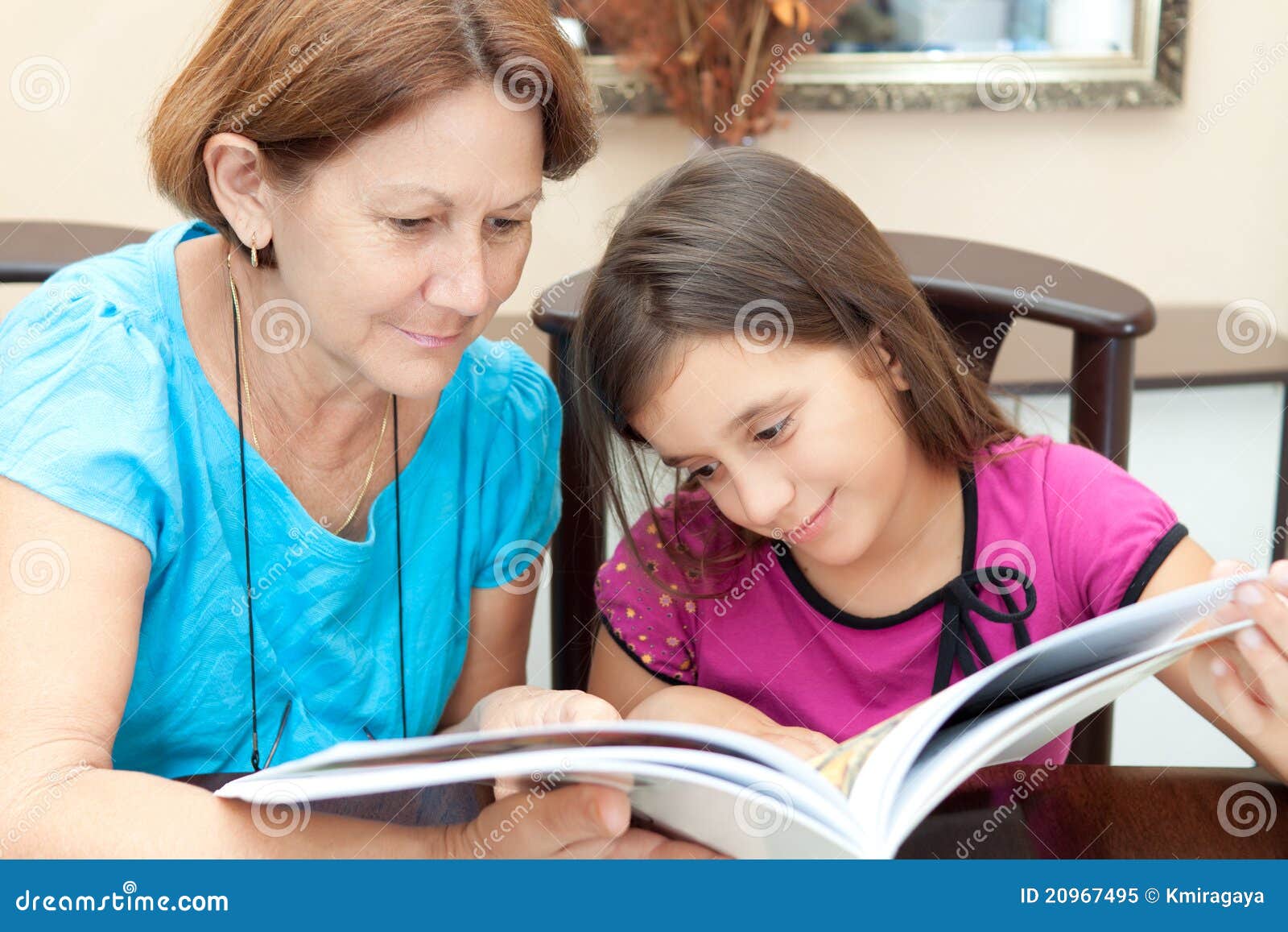 Grandma and Girl Reading a Book Stock Image - Image of grandmother ...