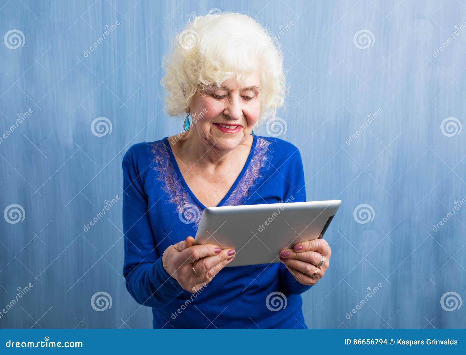 Grandma Holding Tablet Computer Stock Photo - Image of communication ...