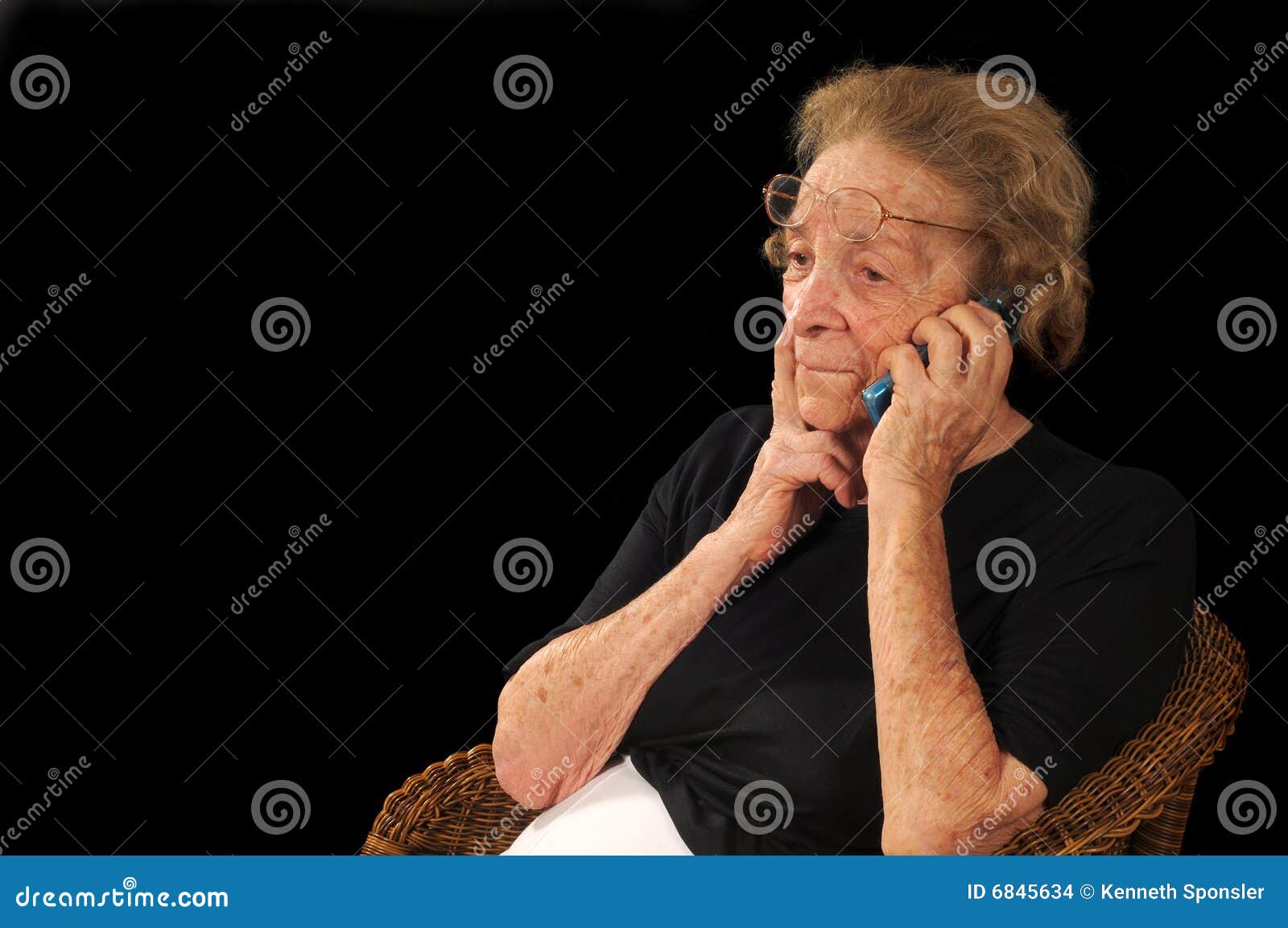 Grandma on phone stock photo. Image of lines, chair, grasp - 6845634