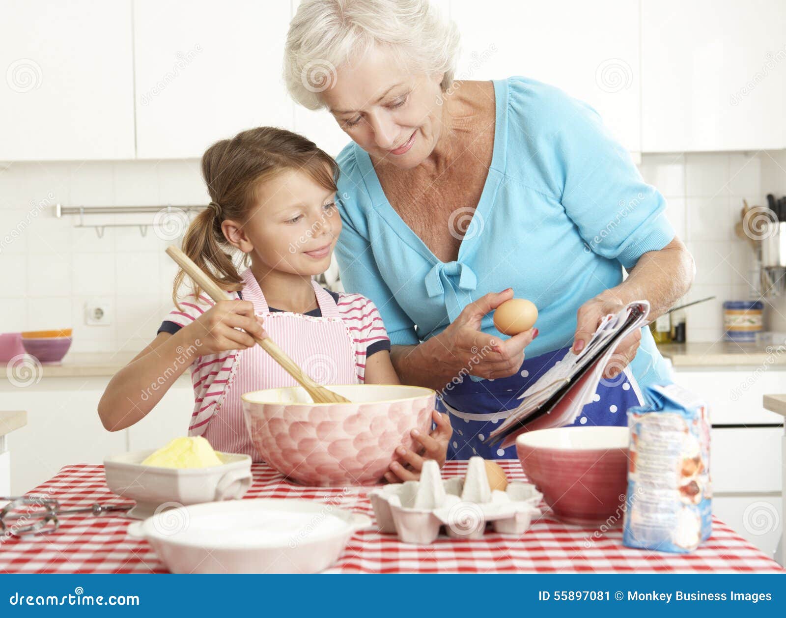 Grandmother and Granddaughter Baking in Kitchen Stock Image - Image of ...