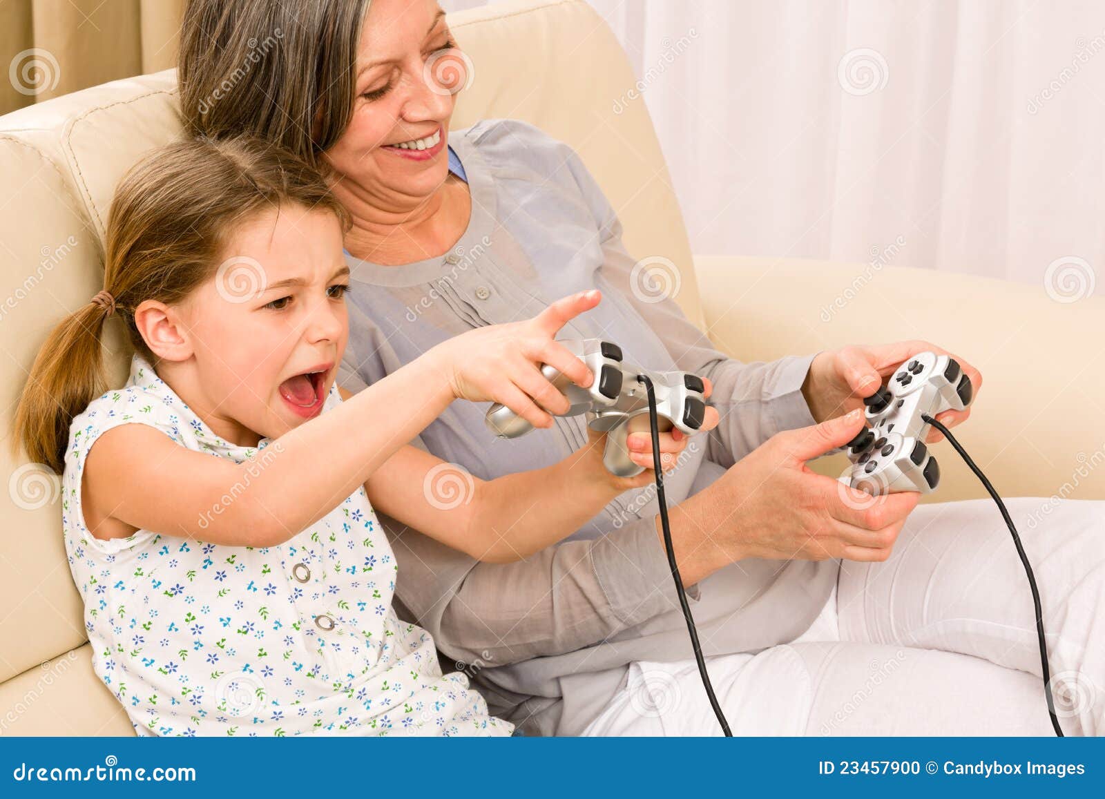Grandmother and Granddaughter Play Computer Game Stock Photo - Image of ...