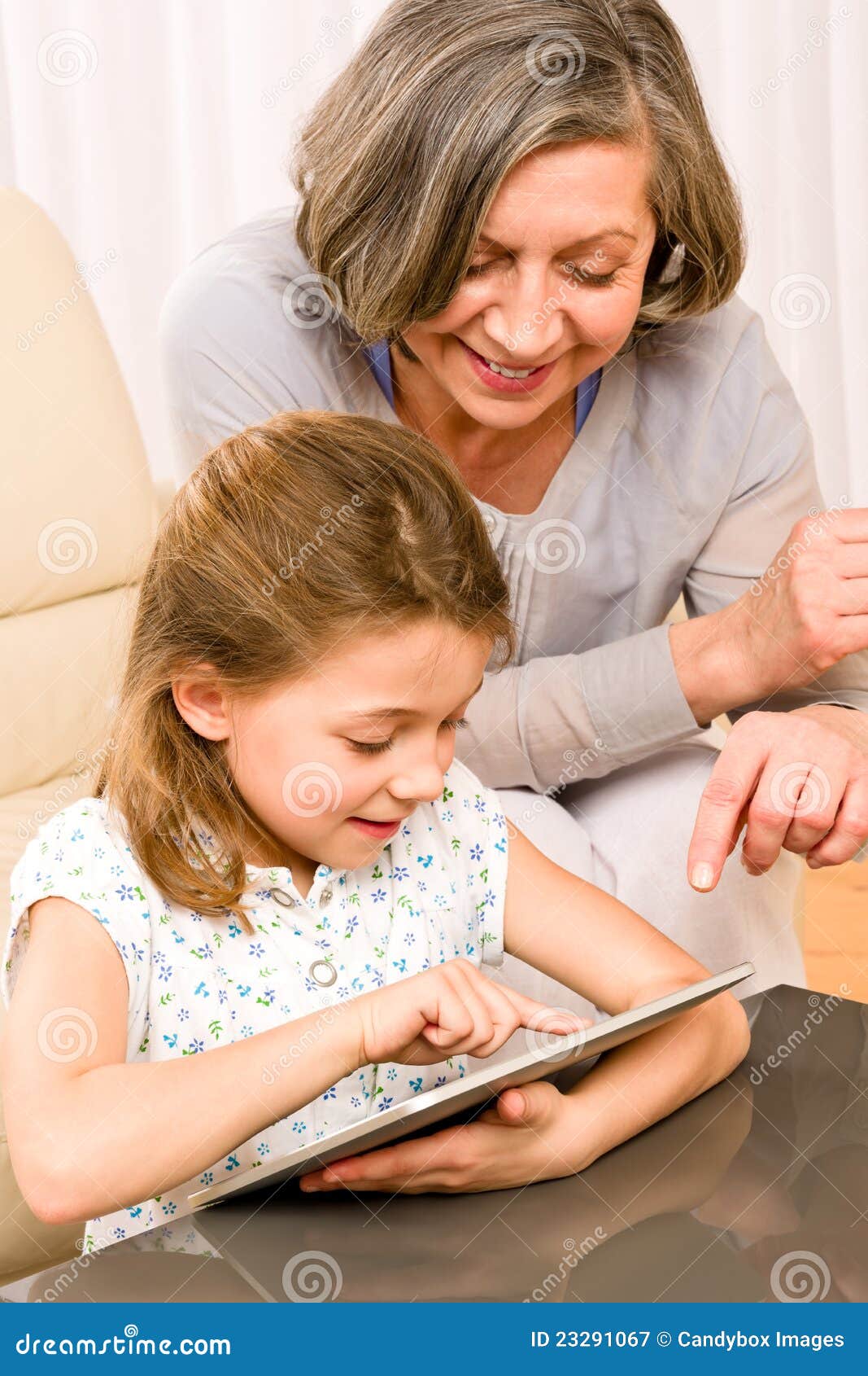 Grandmother with Granddaughter Use Touch Tablet Stock Image - Image of ...