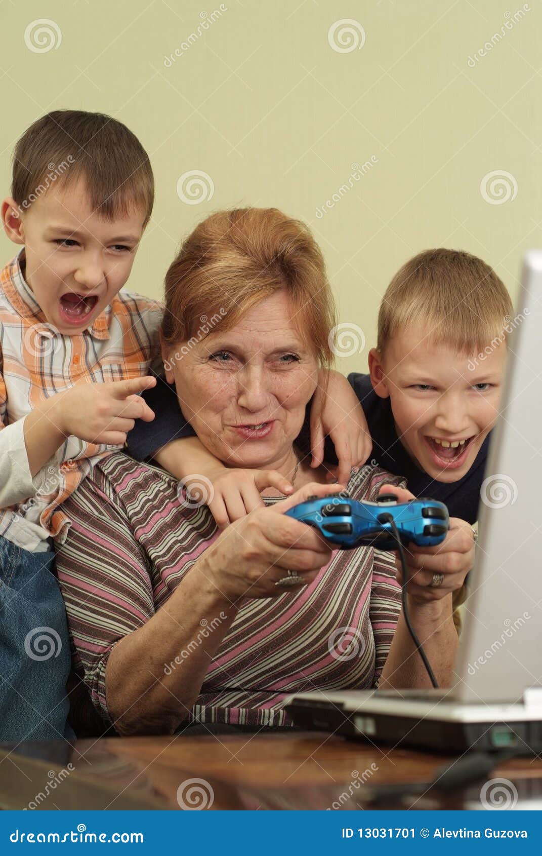 Grandmother At The Computer, An Old Woman In Headphones Looks At The ...
