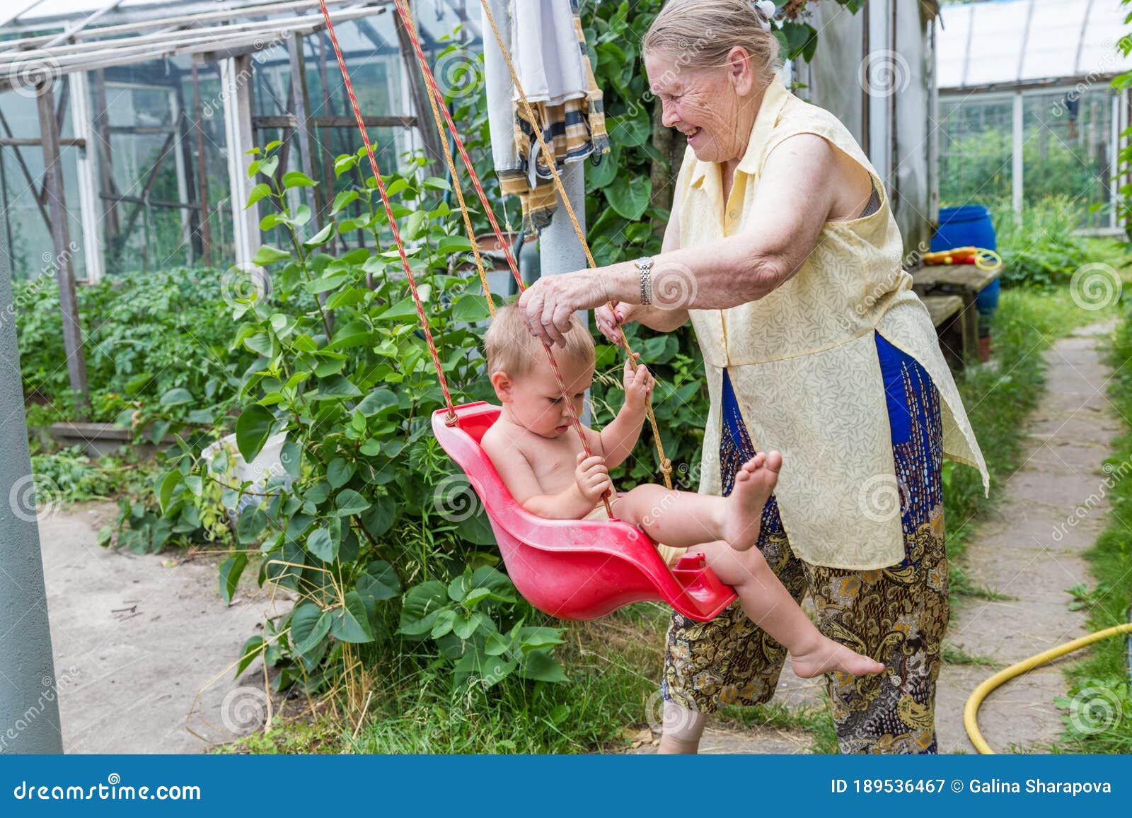 Grandmother Shakes Her Grandson On A Swing Stock Image Image Of Happy