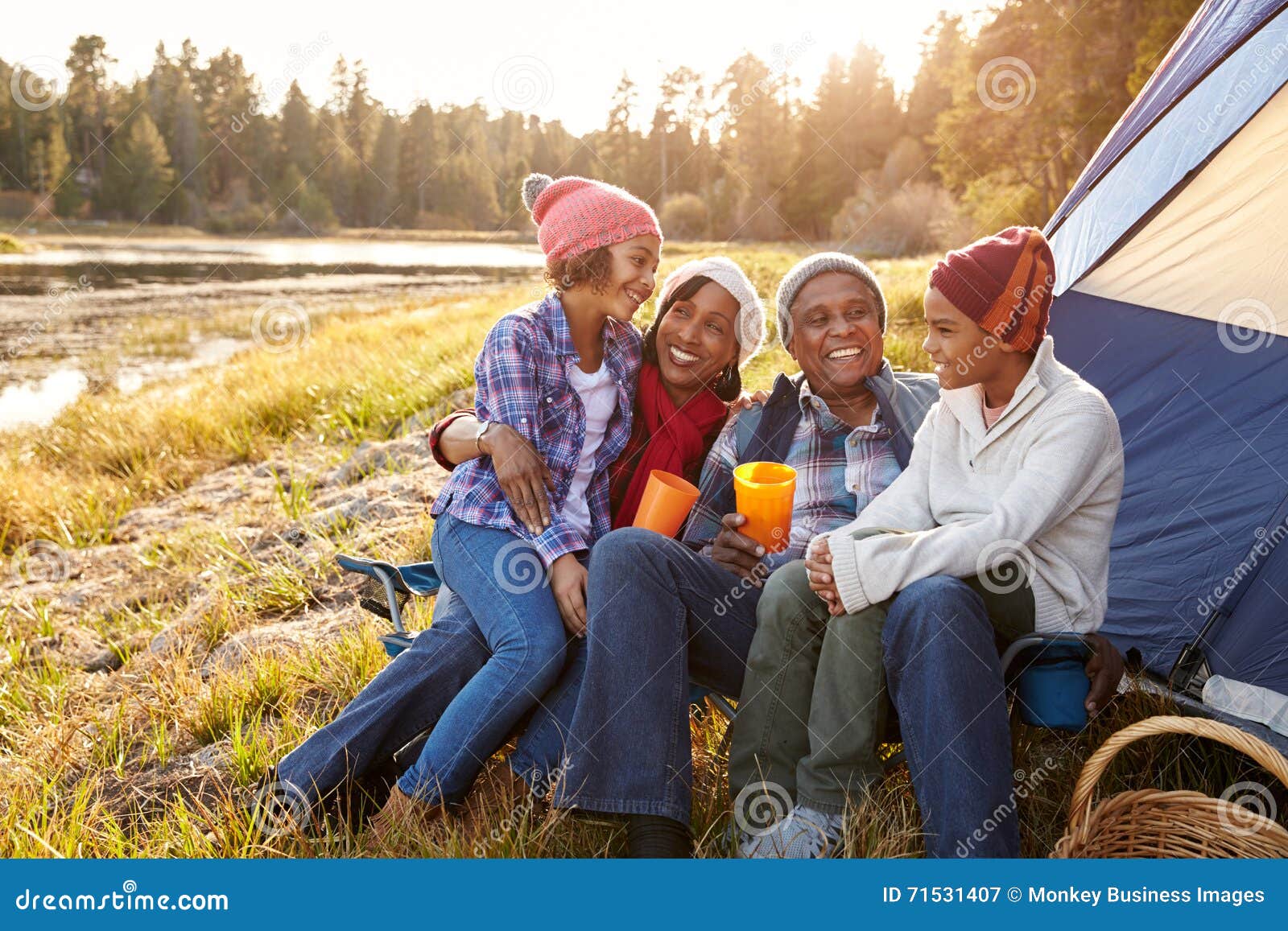 Grandparents with Children Camping by Lake Stock Image - Image of ...