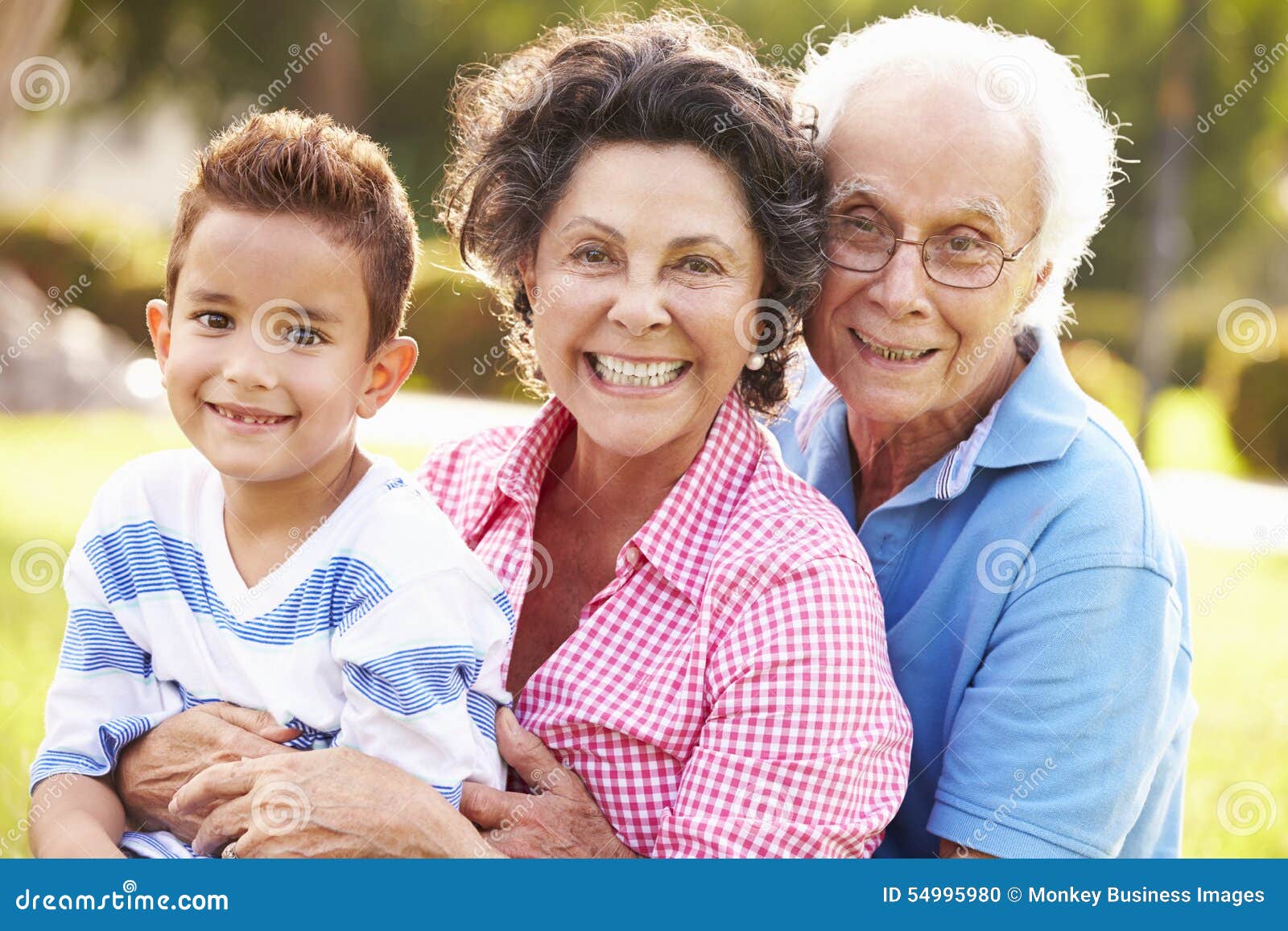 Grandparents Having Fun in Park with Grandson Stock Photo - Image of ...