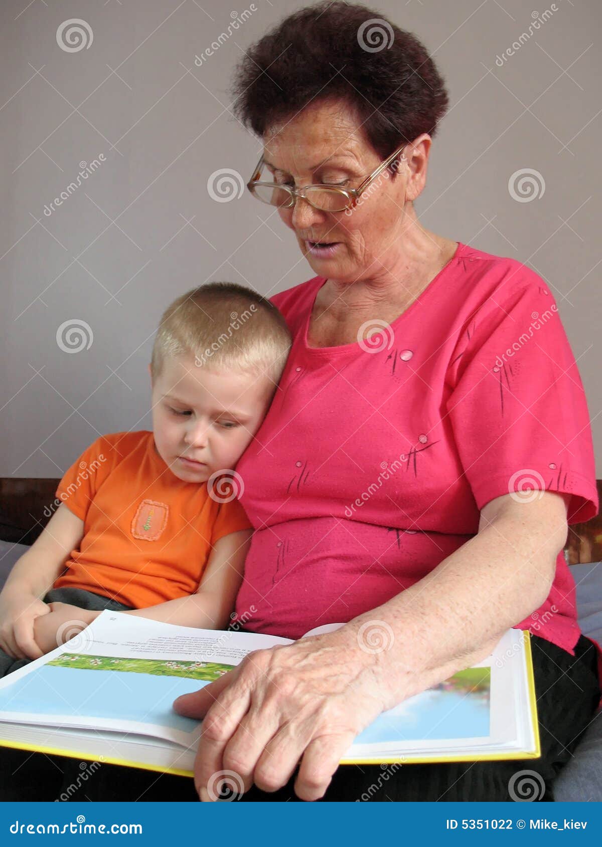 Grandson and Grandmother Read a Book Stock Photo - Image of granny ...