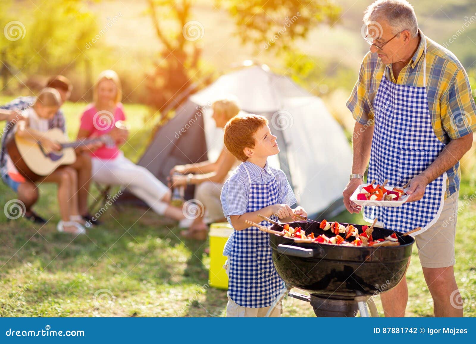 Grandson Grilling Barbecue with Grandfather Stock Photo - Image of ...