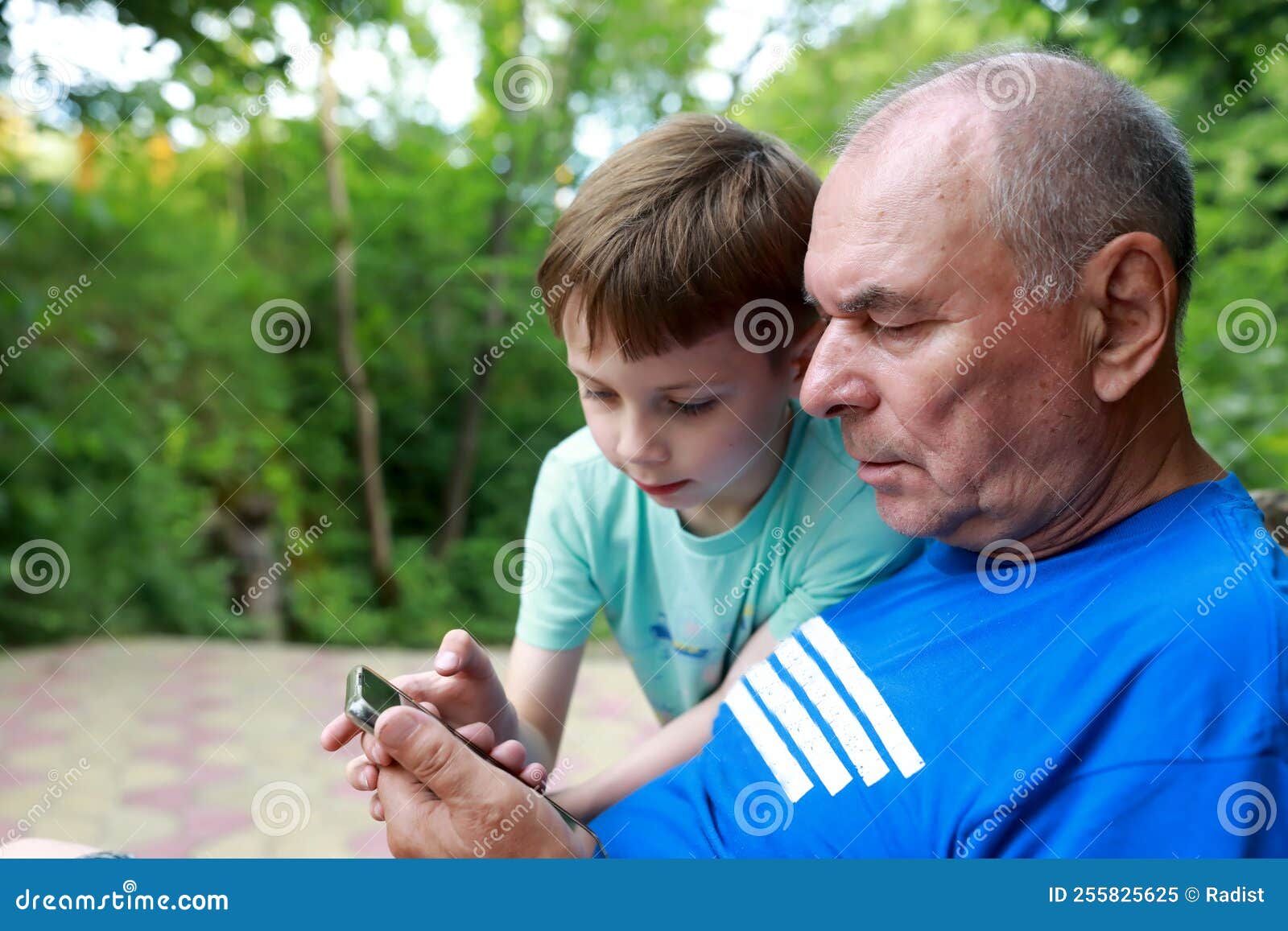 Grandson Teaches Grandfather How To Use Smartphone Stock Image - Image ... Grandson Teaches Grandfather How To Use Smartphone Stock Image - Image ...