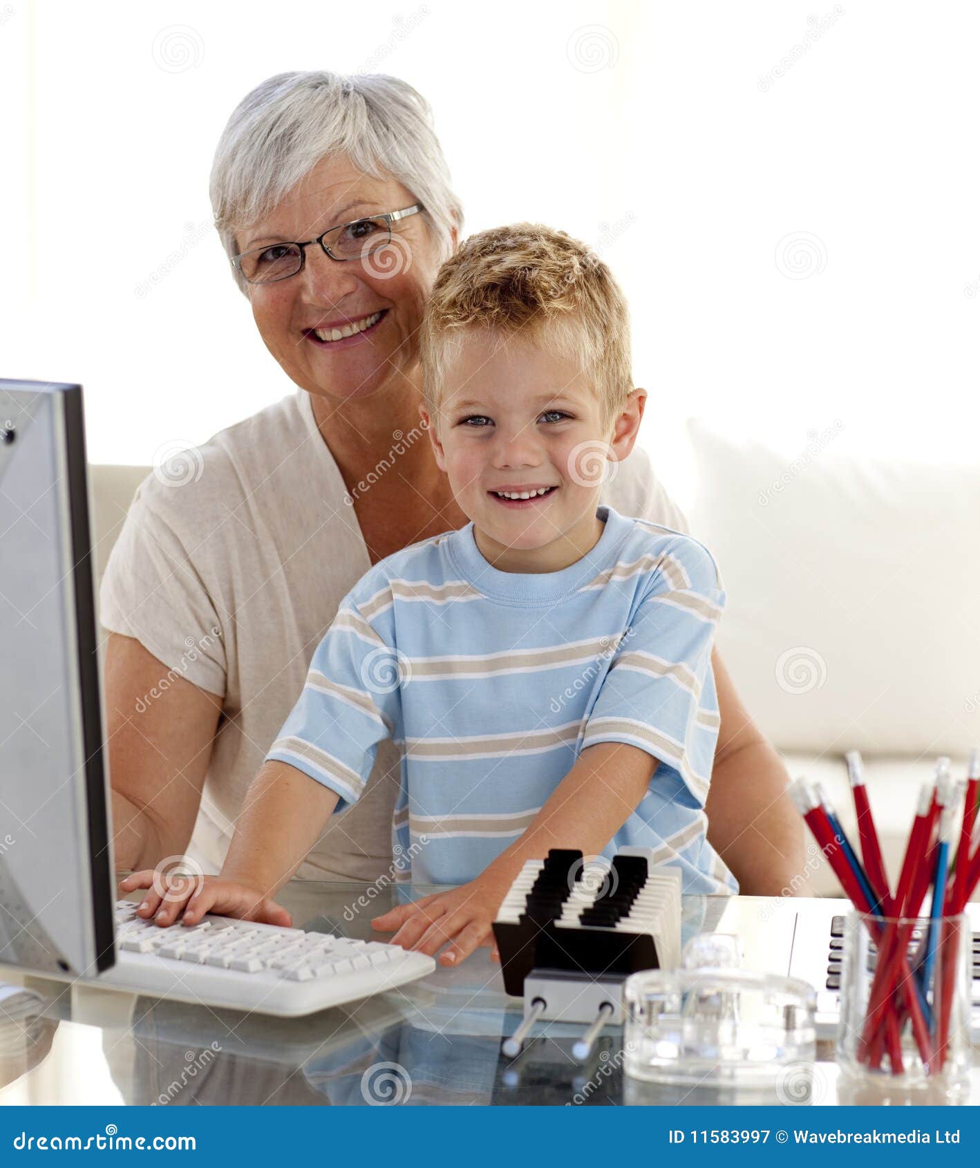 Grandson Using a Computer with His Grandmother Stock Image - Image of ...