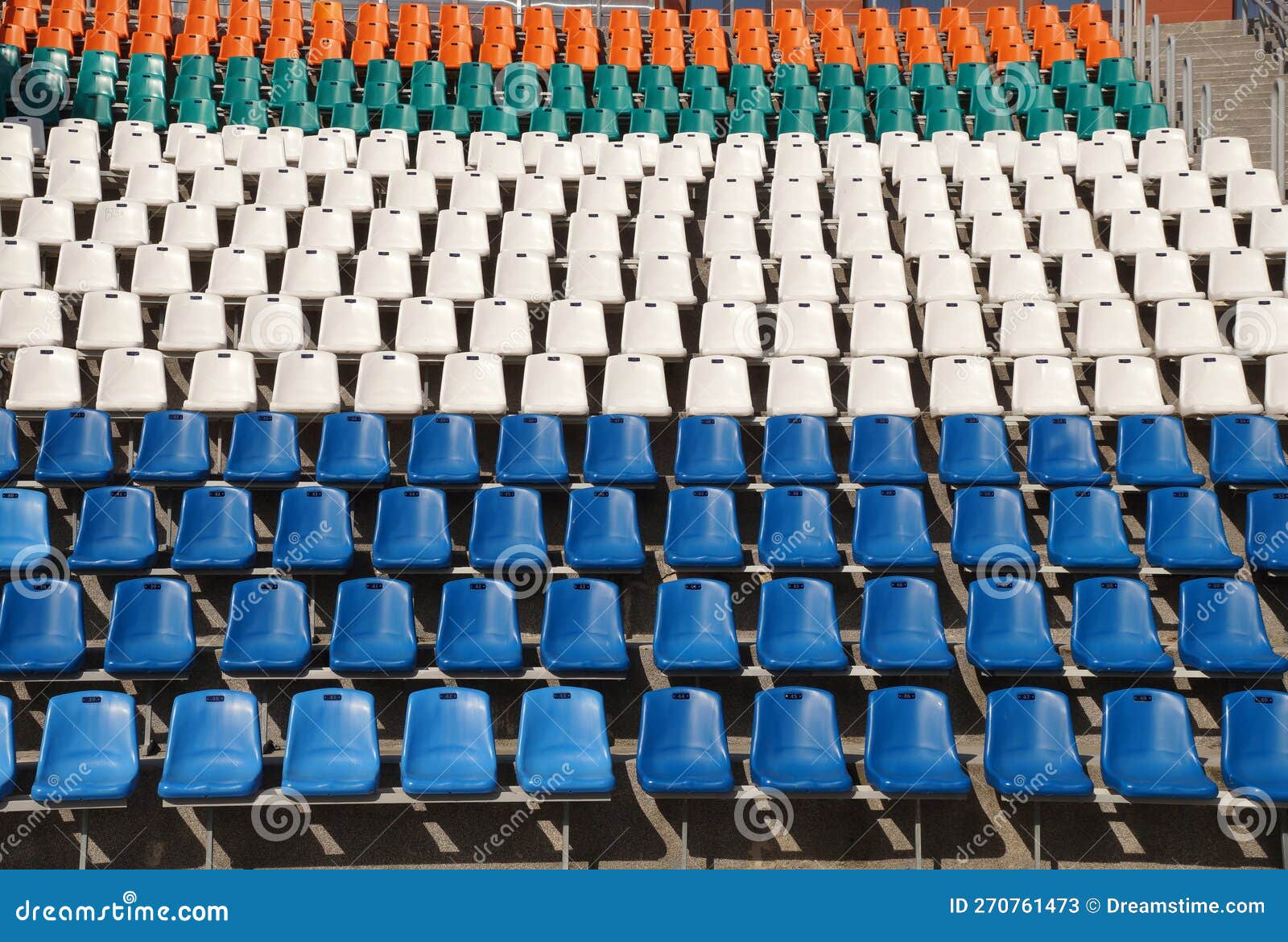 A Grandstand with Plastic Seats in a Small Stadium Stock Image - Image ...