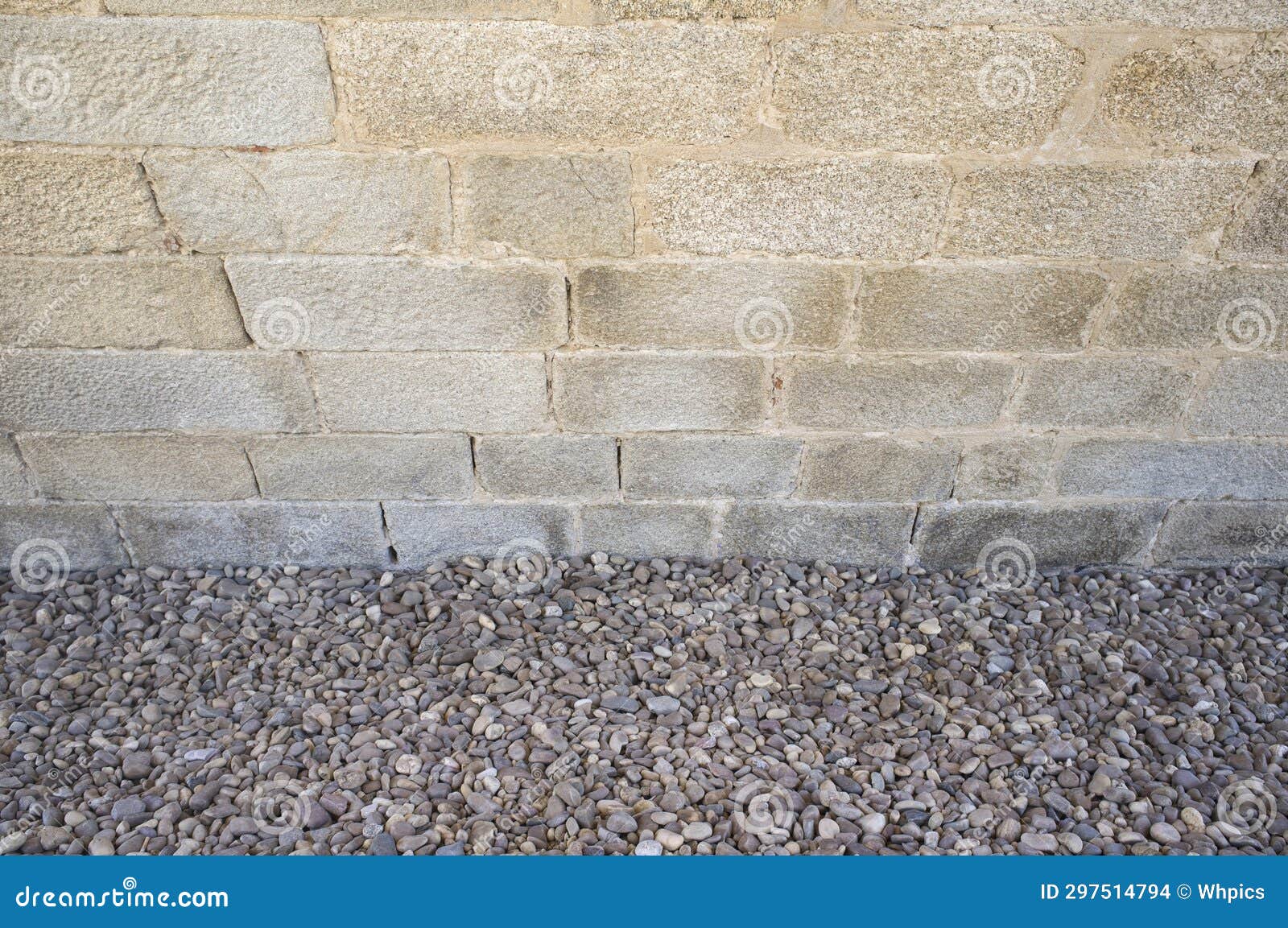 Granite Ashlars Wall with River Pebble Stones As Ground Stock Photo ...