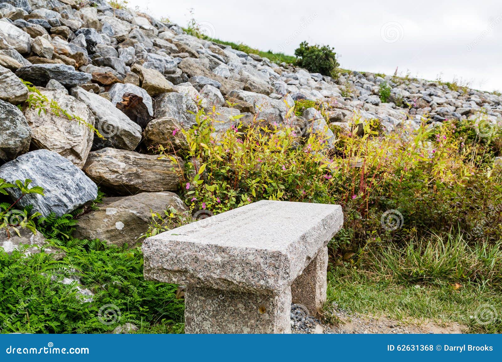 Granite Bench by Rock Wall stock photo. Image of texture - 62631368