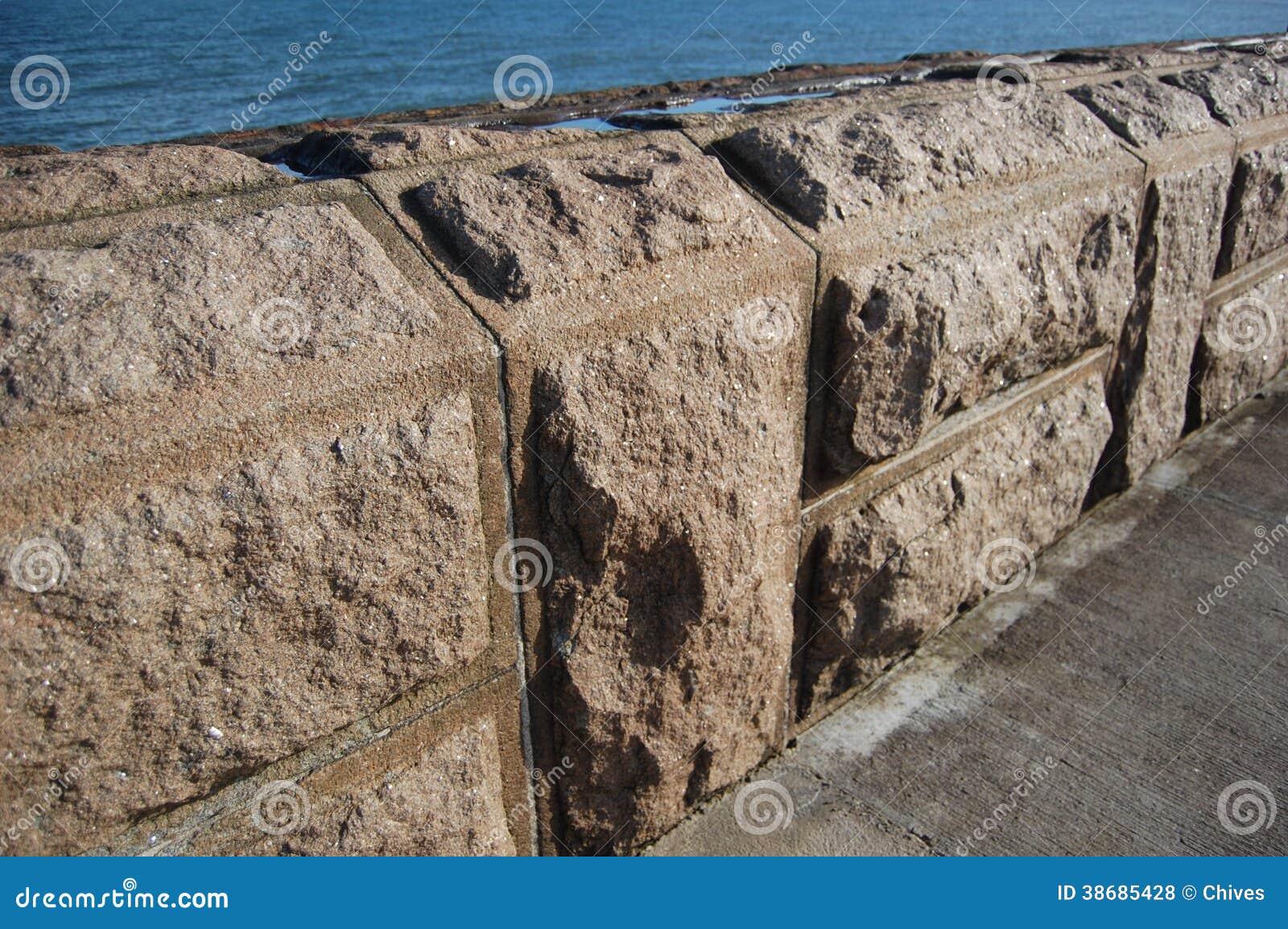 Granite blocks on the pier stock photo. Image of north - 38685428
