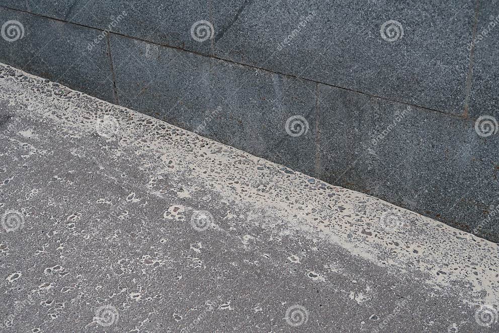 Granite Curb and Sand on Dark Asphalt Stock Image - Image of brown ...
