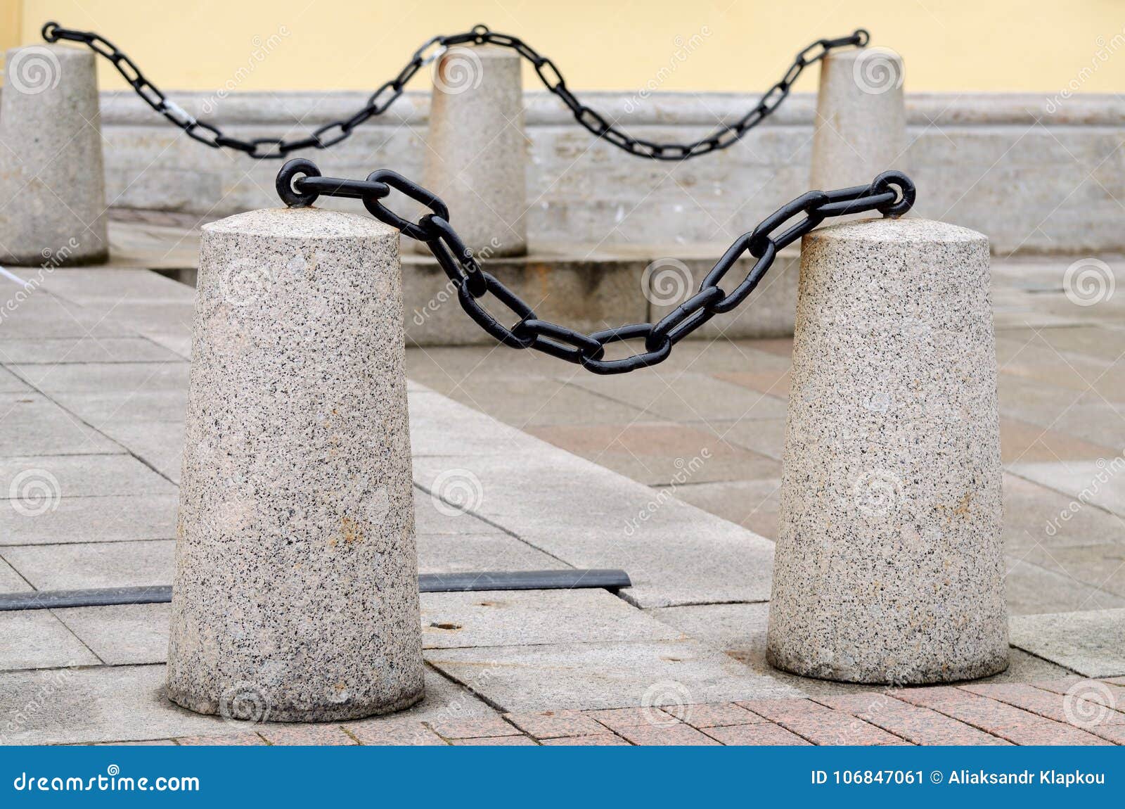 Granite posts with chains. stock image. Image of tone - 106847061