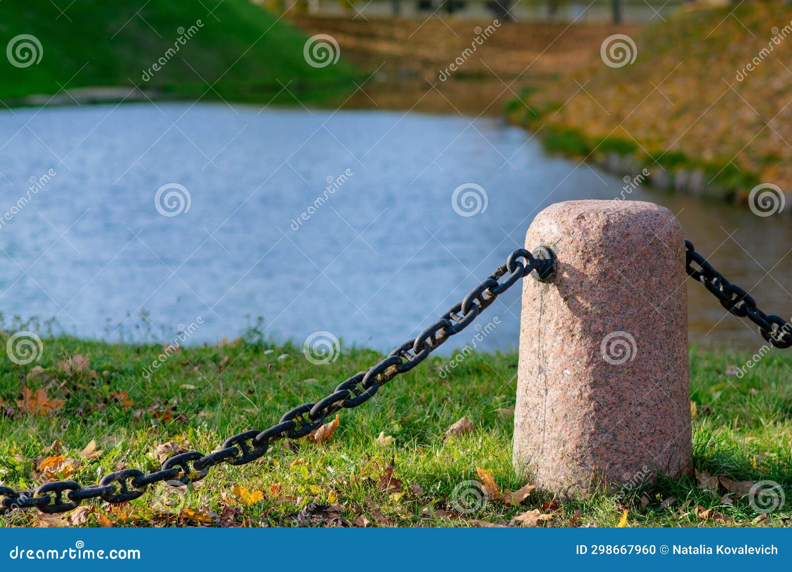 Granite Posts with a Large Iron Chain Stock Photo - Image of pavement ...