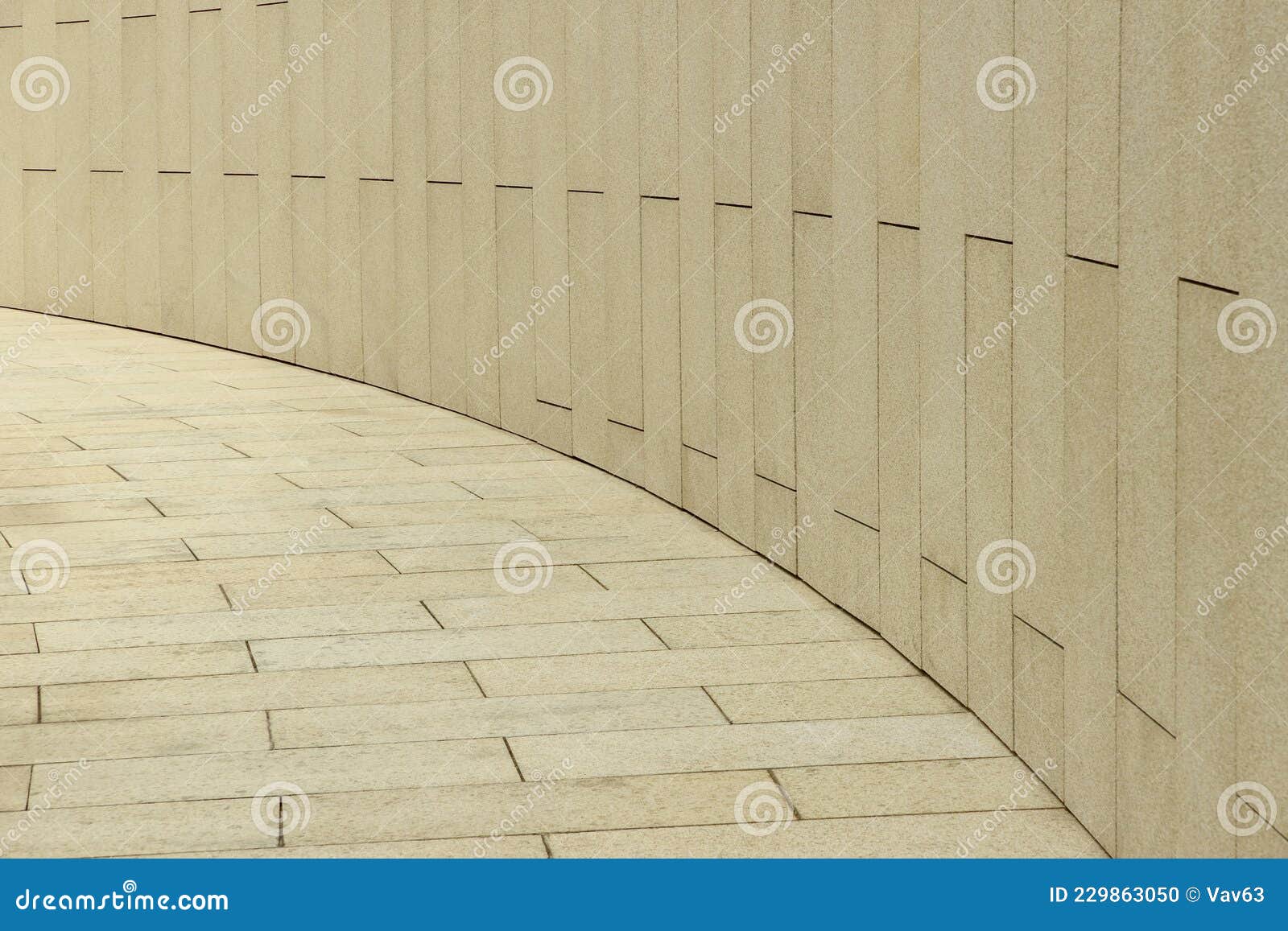 Granite wall and footpath stock photo. Image of road - 229863050