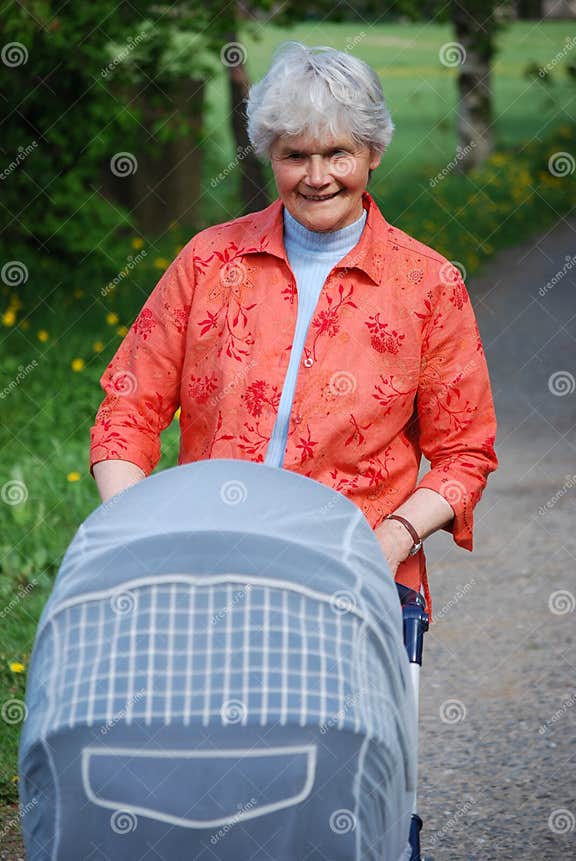 Granny with baby buggy stock image. Image of gran, aged - 18918647
