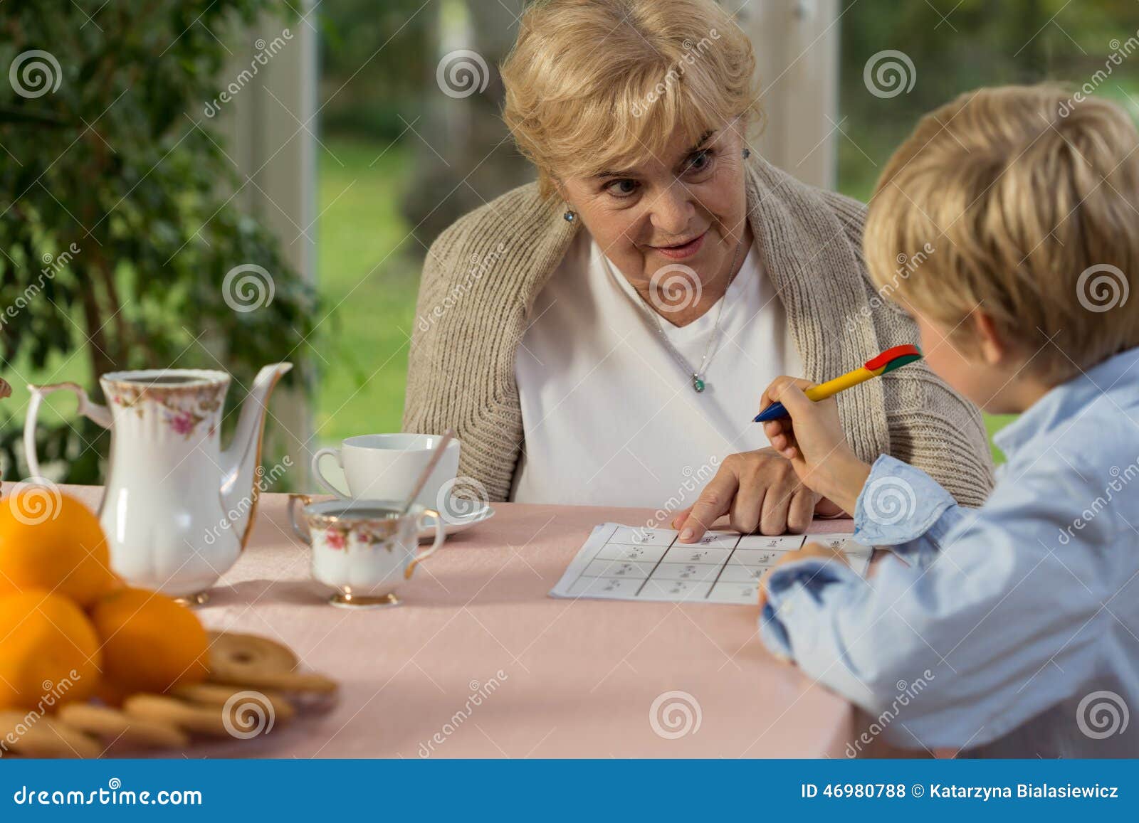Granny Helping His Grandson Stock Photo - Image of granny, older: 46980788