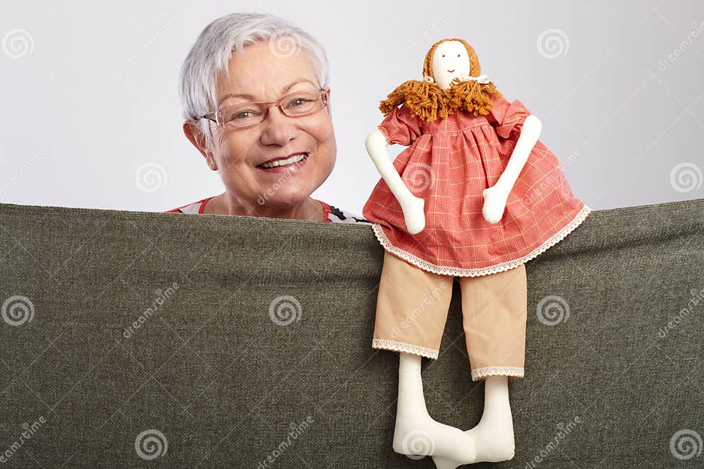 Granny Presenting a Puppet Show Stock Image - Image of older, glasses ...
