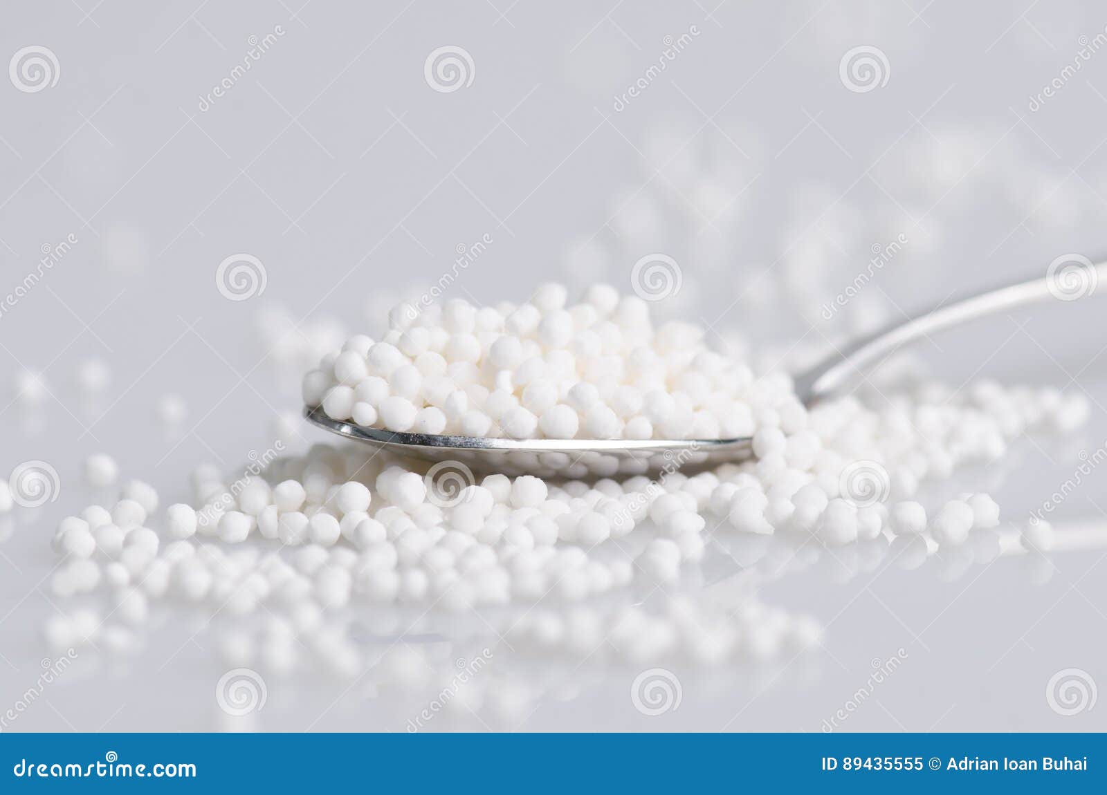 Granulated Cassava Tapioca in Steel Spoon Isolated on White Ba Stock ...
