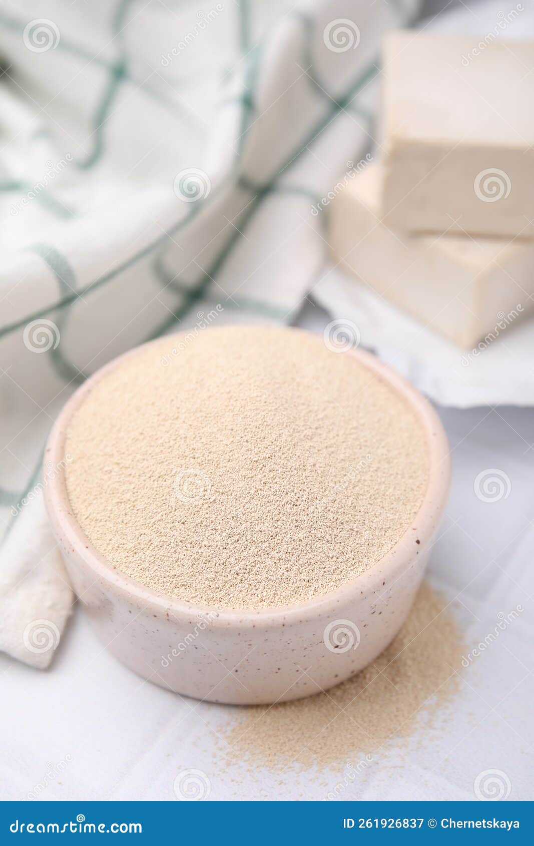 Granulated Yeast in Bowl on White Tiled Table, Closeup Stock Image ...