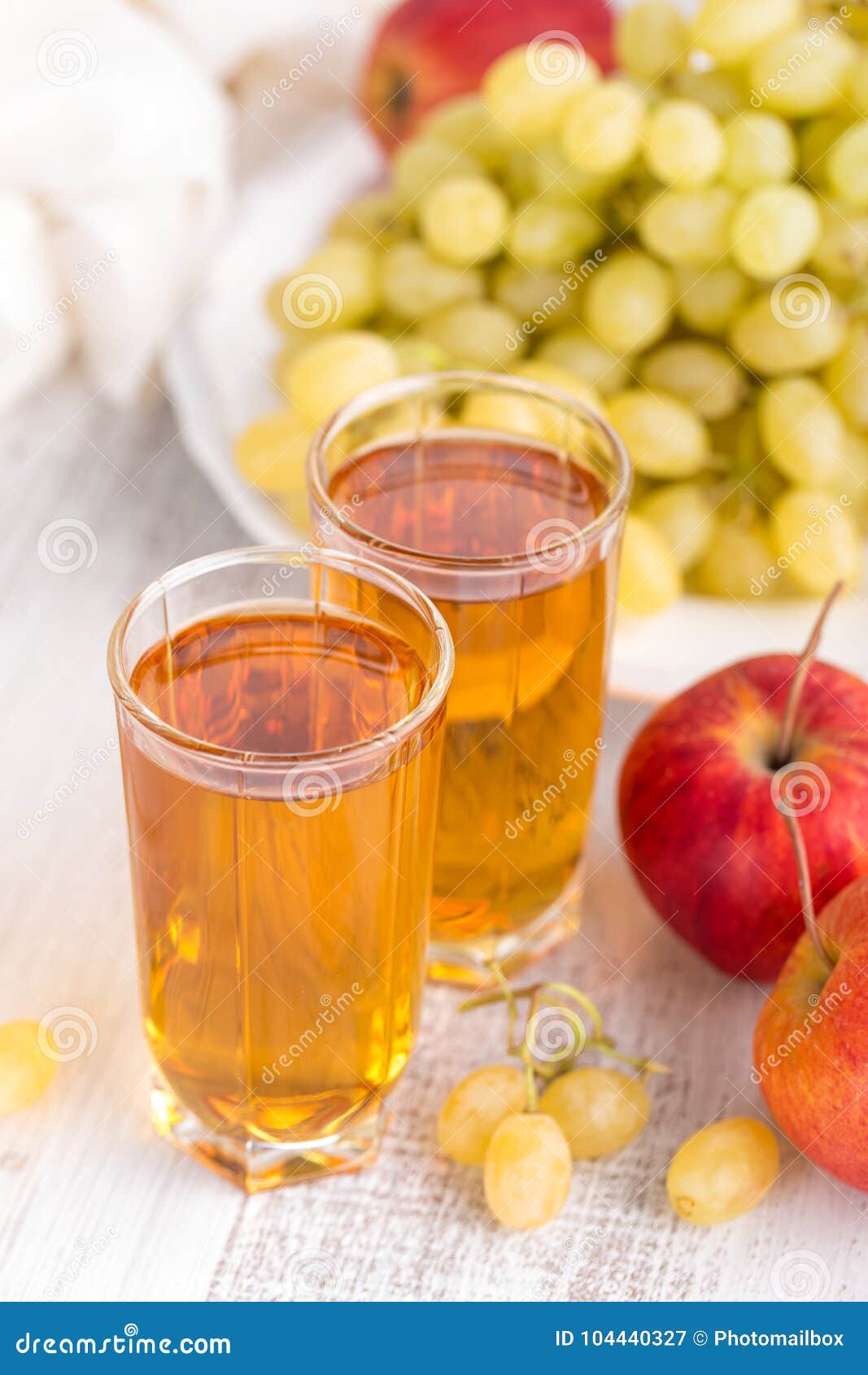 Grape and apple juice stock image. Image of sweet, beverage - 104440327