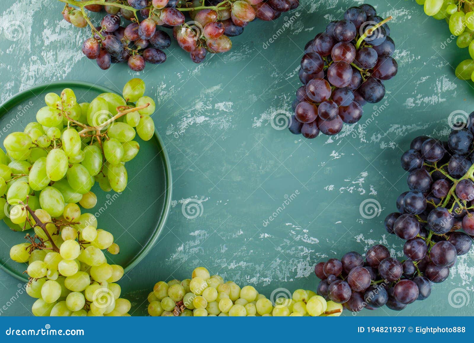 Grape Clusters in a Tray Flat Lay on a Plaster Background Stock Image ...