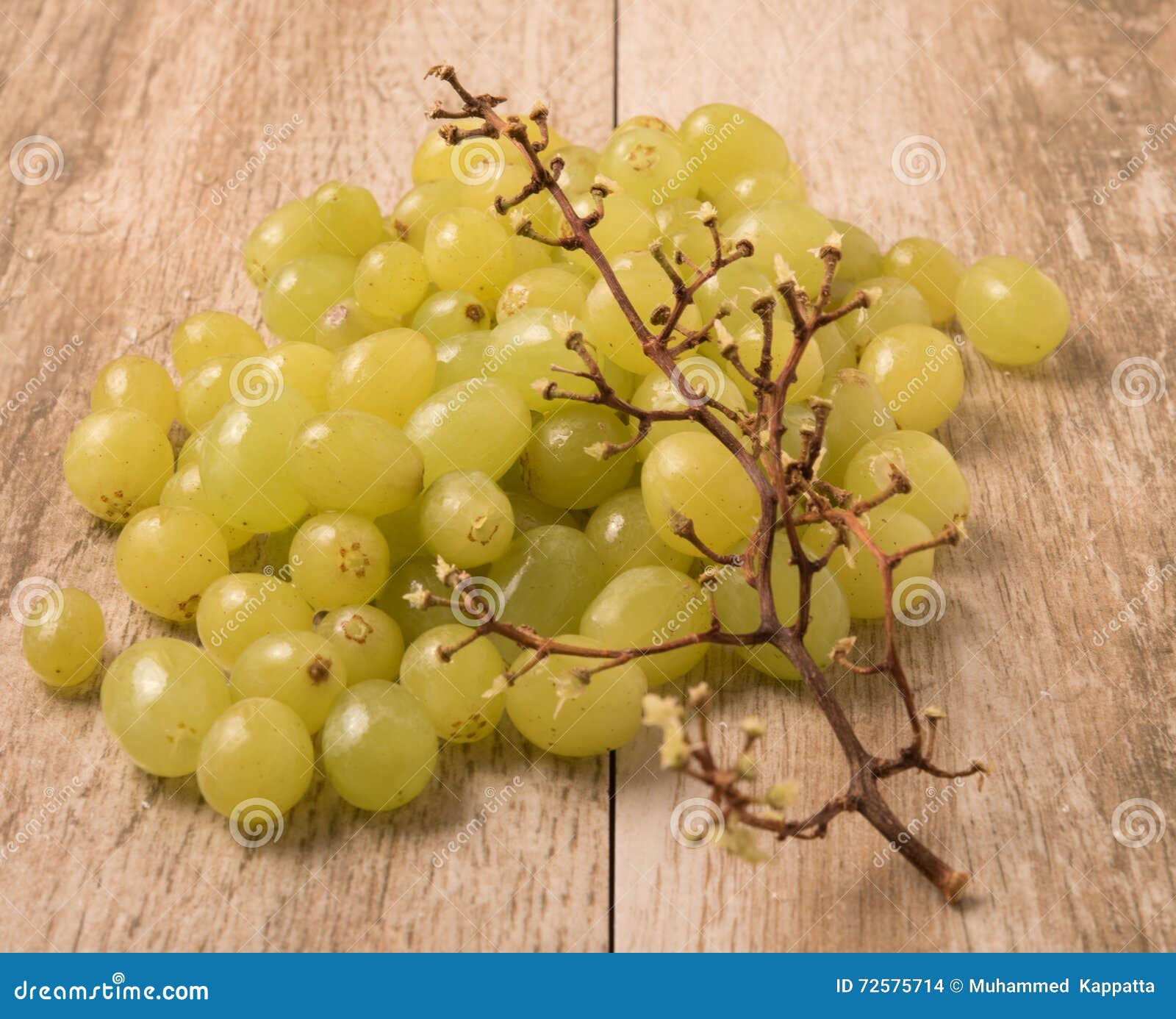 Grape Fruit Stem Alone in Front of Heap of Green Grapefruit on Wooden ...