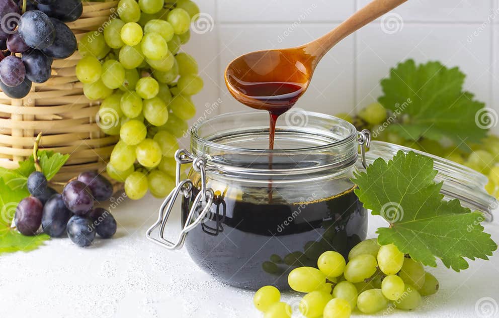 Grape Molasses and Fresh Organic Grapes Stock Image - Image of molasses ...