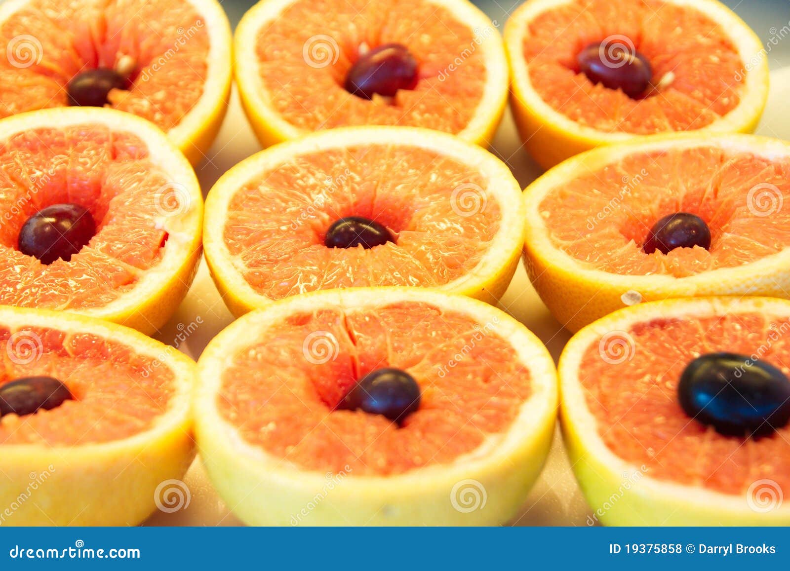 Grapefruit Halves with Garnish of Grapes Stock Photo - Image of fruit ...