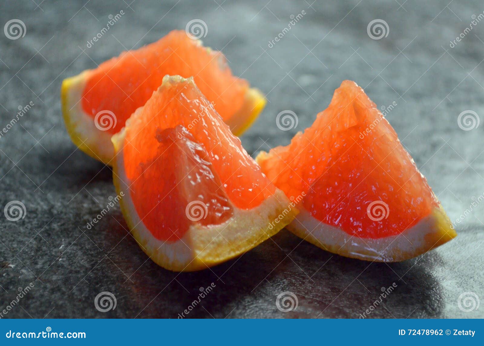 Grapefruit pieces stock photo. Image of grapefruit, close - 72478962