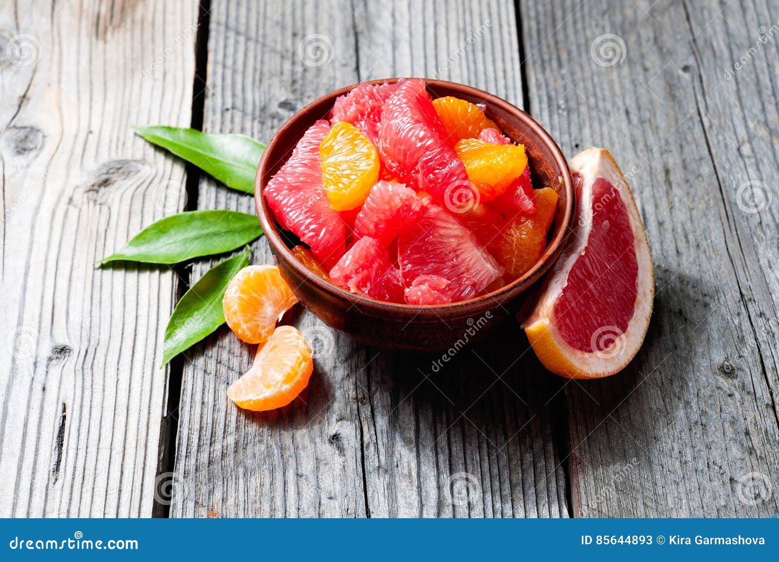Grapefruit Slices on the Table in Bowl Stock Image - Image of drink ...