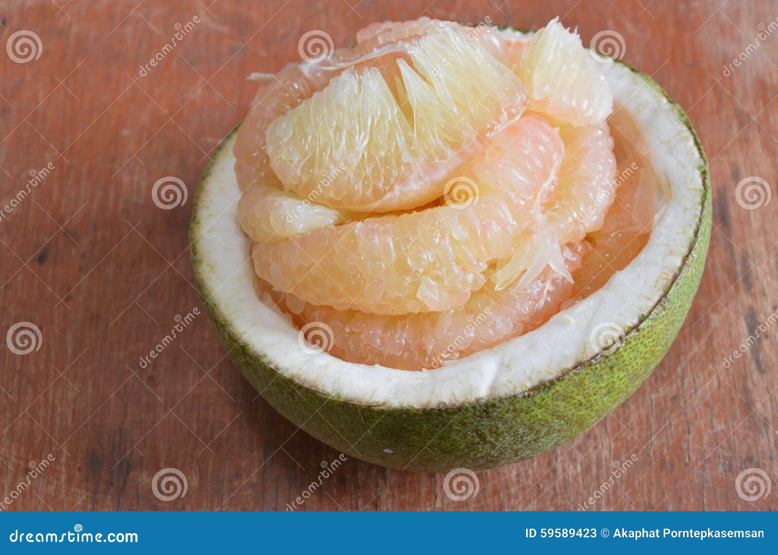 Grapefruit on wooden table stock image. Image of trade - 59589423