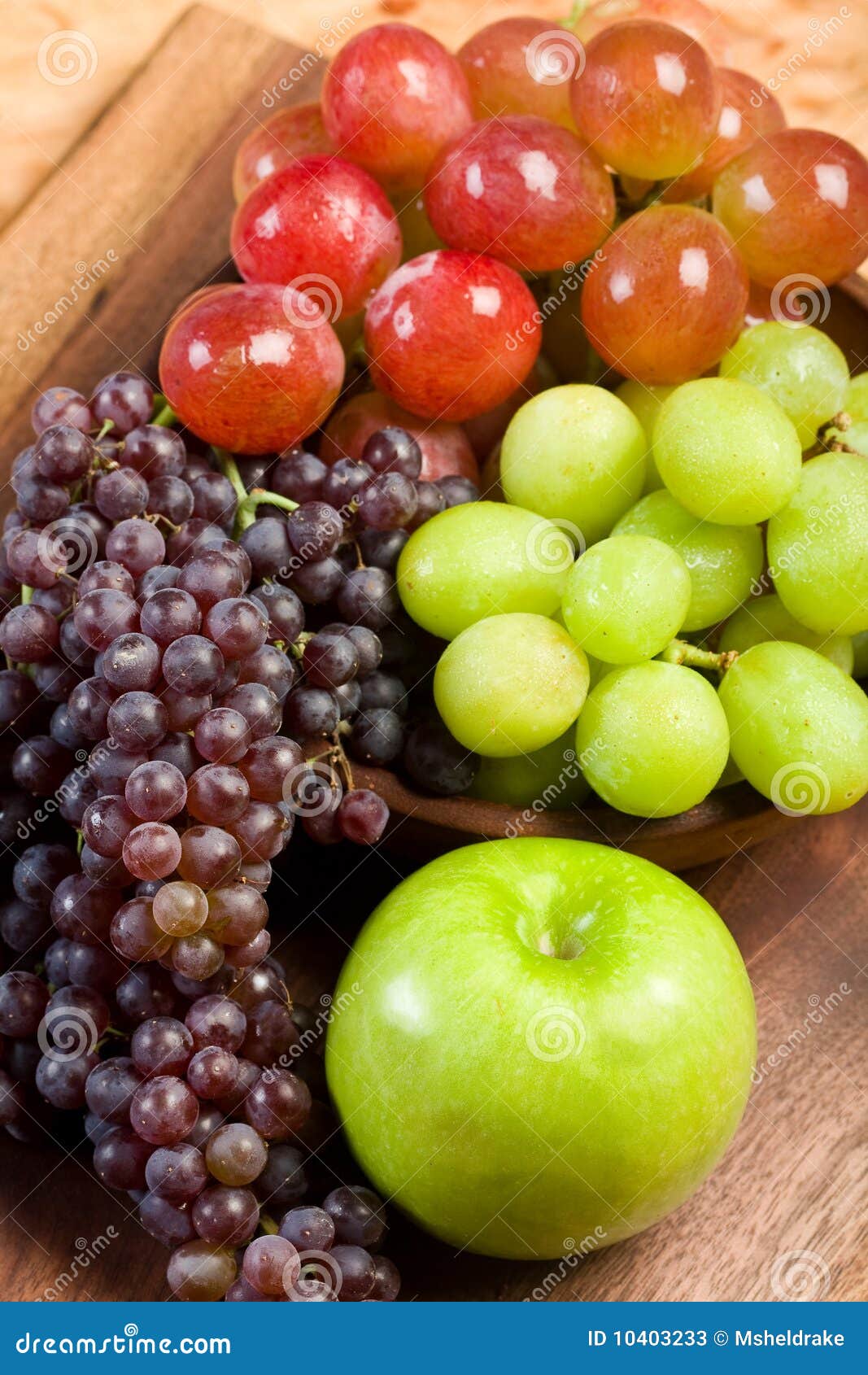 Grapes and Apple stock image. Image of apple, globe, grapes - 10403233