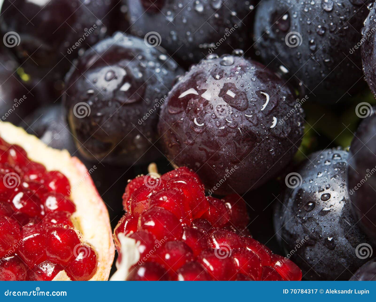 Grapes with pomegranate stock image. Image of juicy, appetizing - 70784317