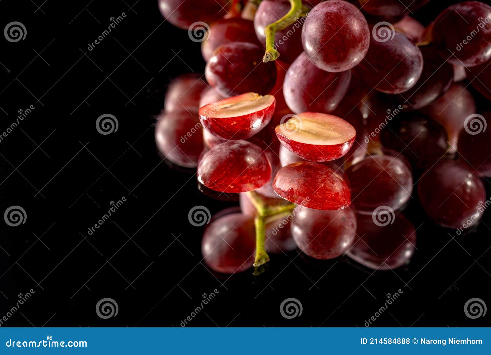 The Grapes Were Cut in Half on the Mirror. Stock Photo - Image of ...