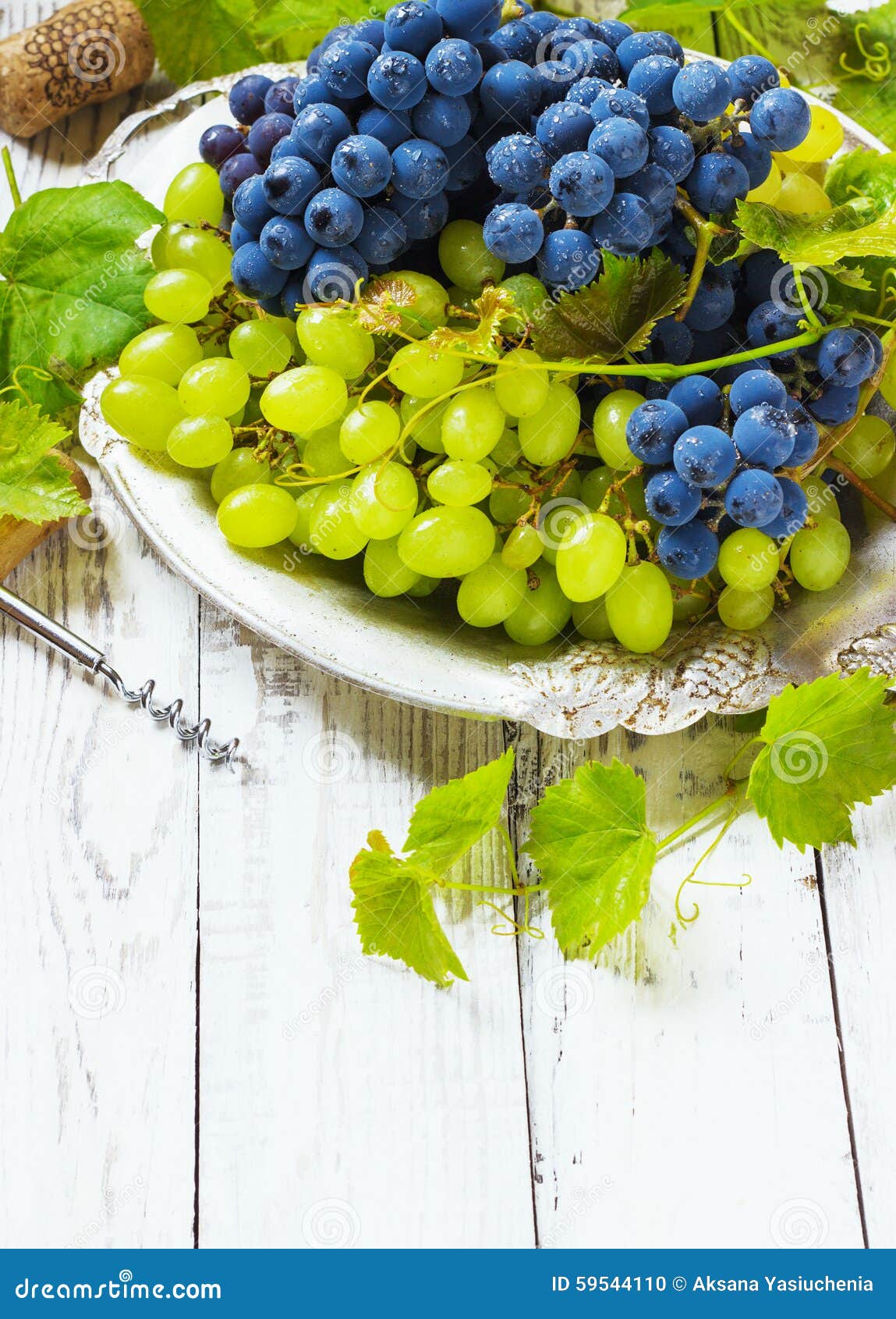 Grapes on a wooden table stock photo. Image of grow, leaf - 59544110